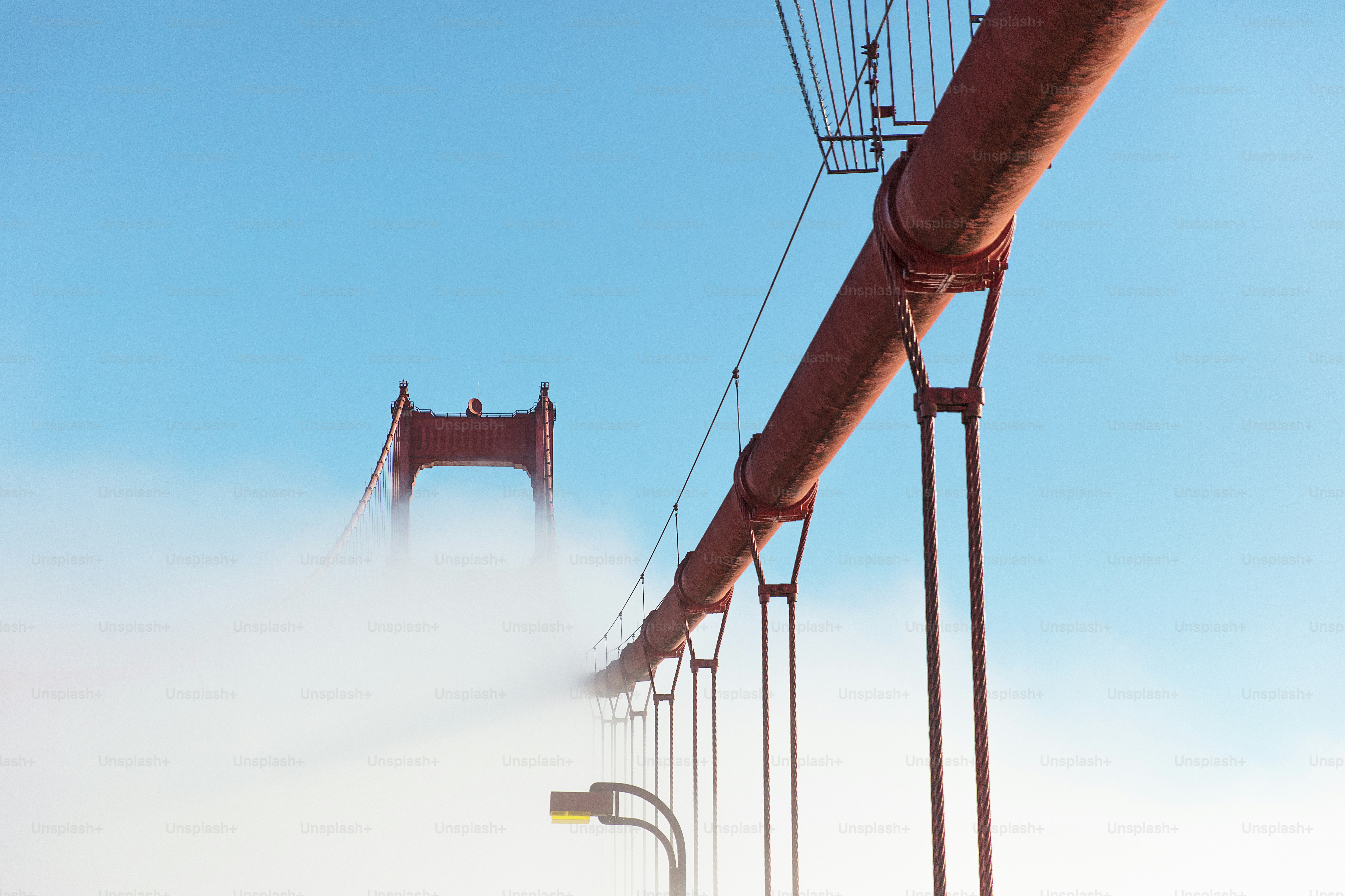 A view of the golden gate bridge from the top of a hill photo ...