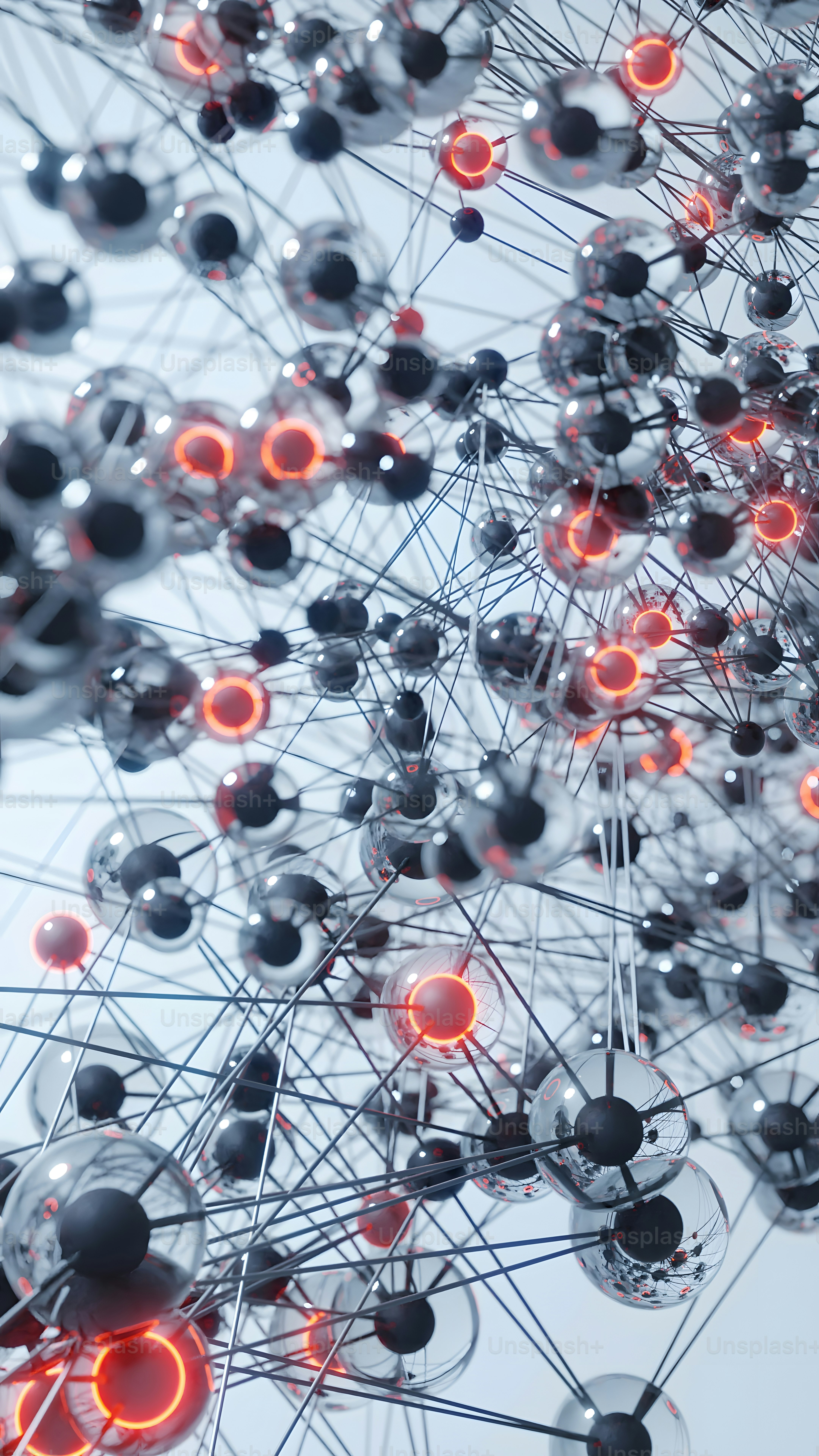 A bunch of red and black balls connected to each other photo ...