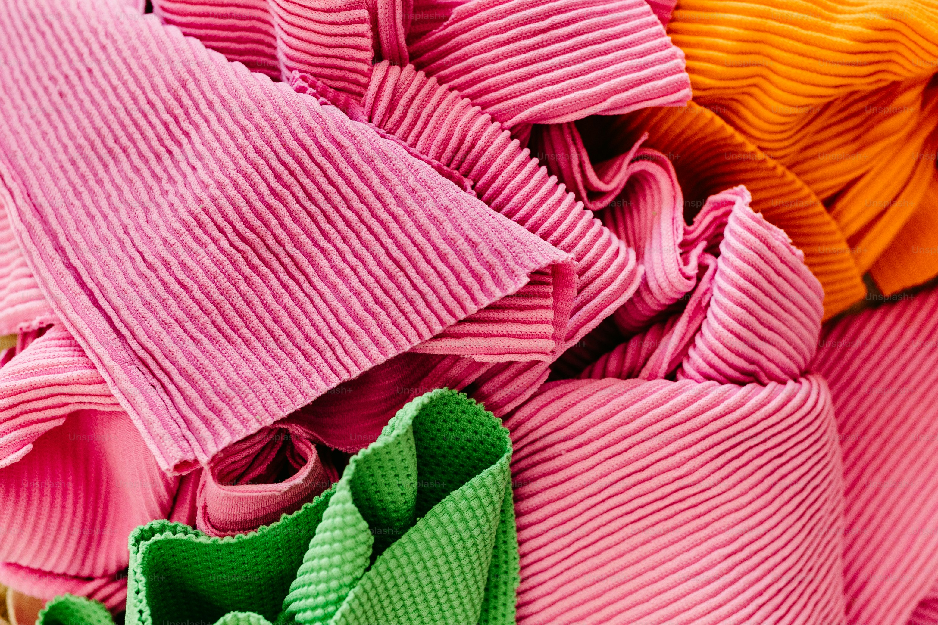 A close up of a pile of cloths photo – Fashion Image on Unsplash