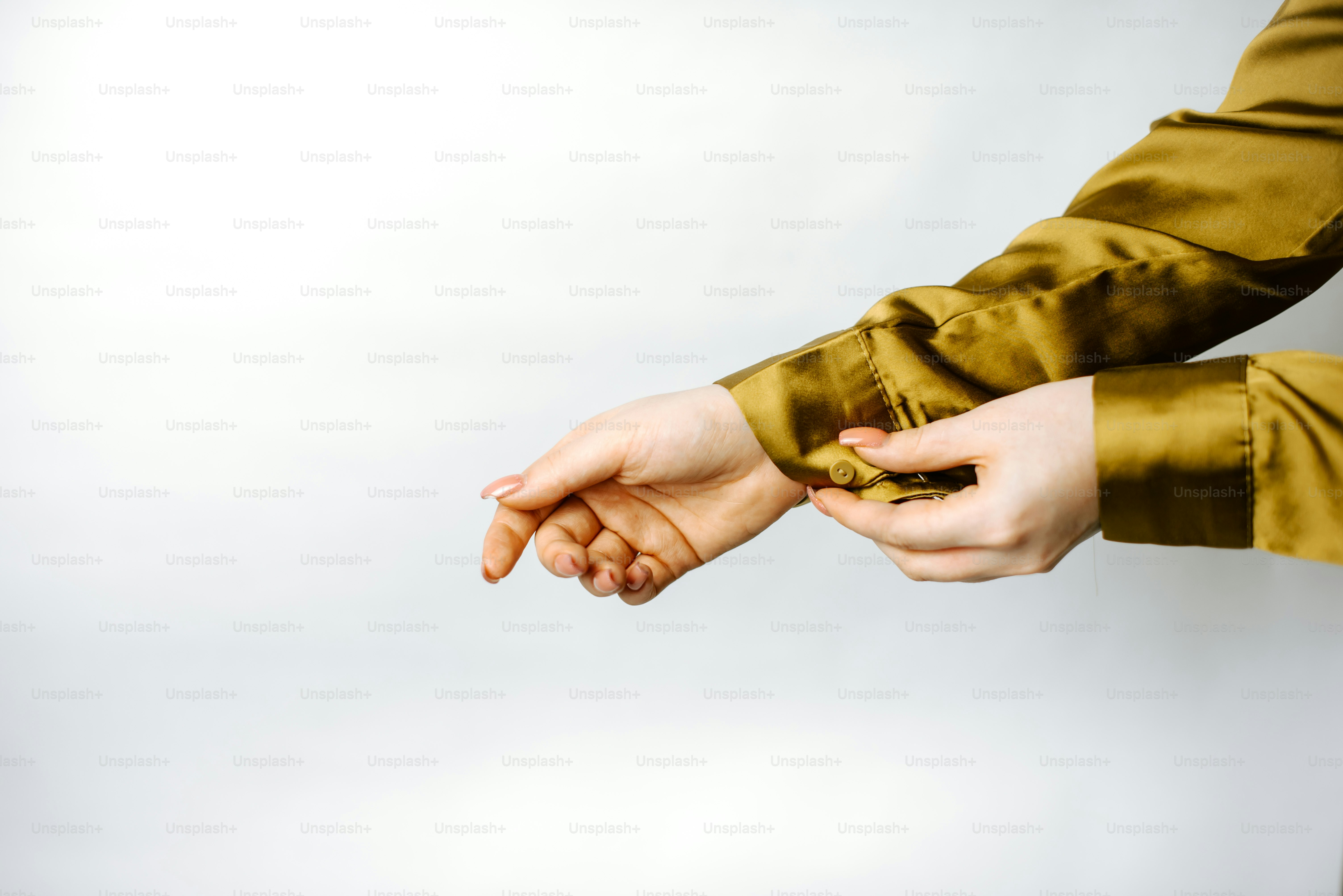 A woman's hand poking through a hole in a paper photo – Woman Image on ...
