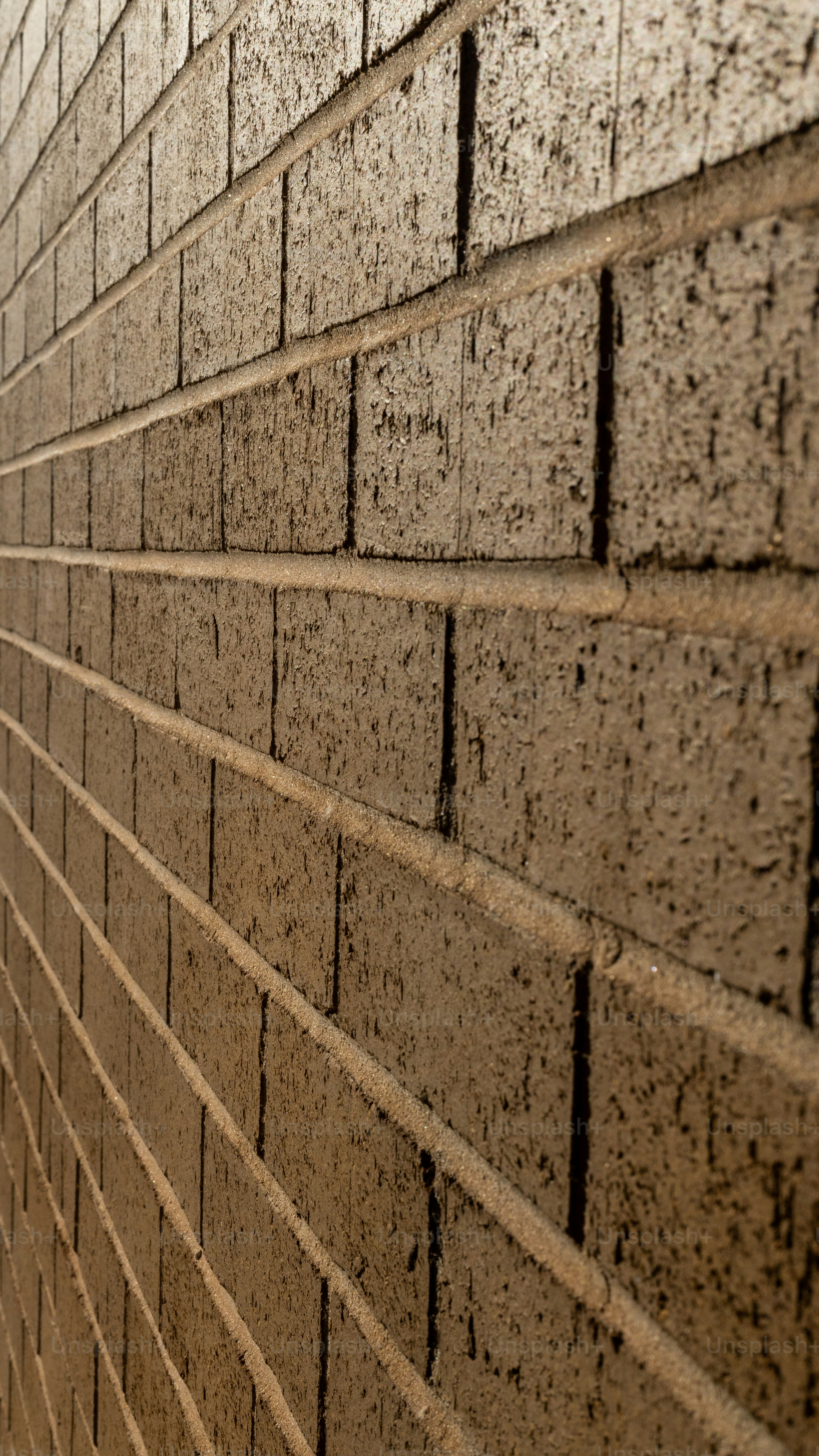 A close up of a brick wall made of red bricks photo – Abstract Image on ...