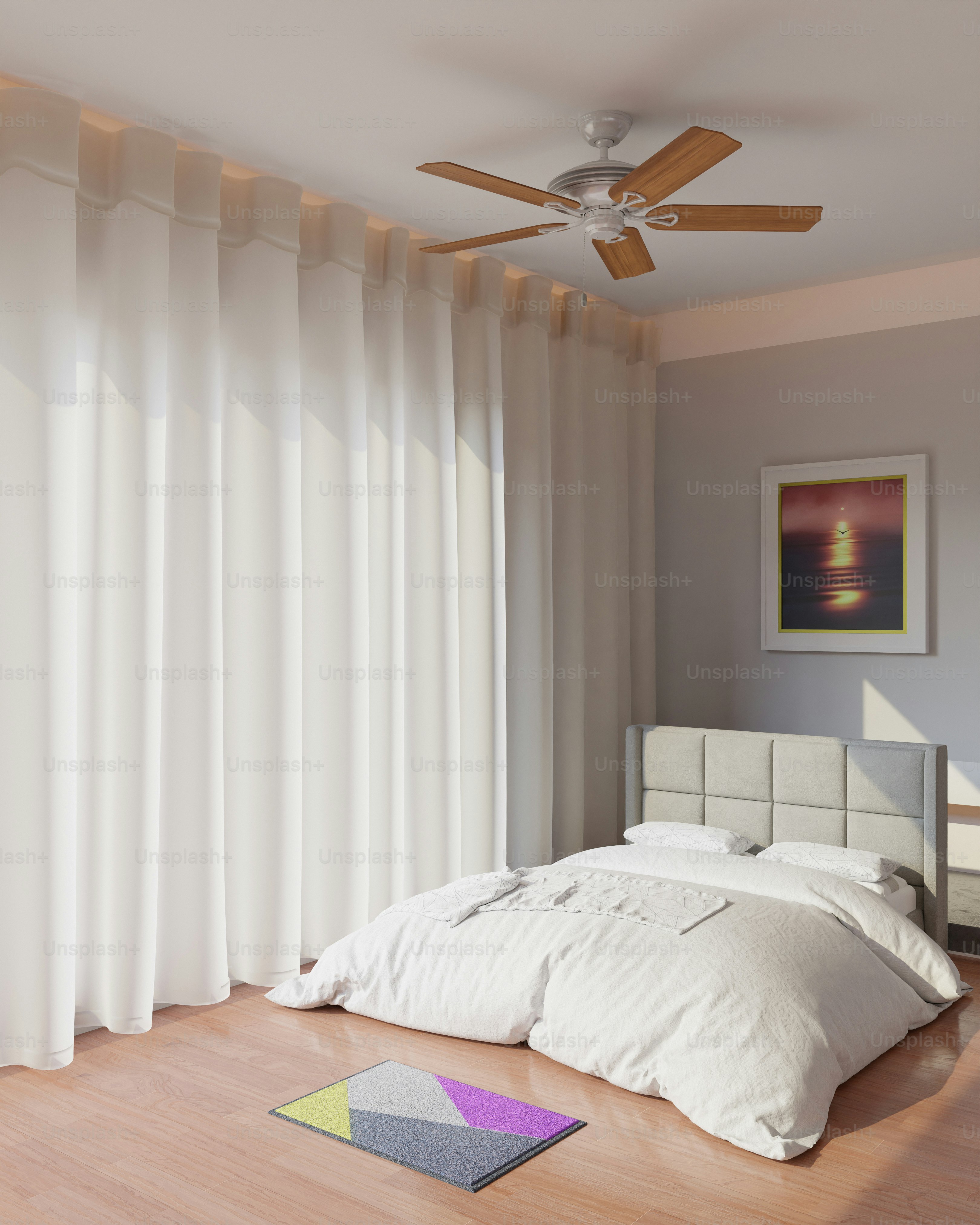 A bedroom with a bed and a ceiling fan photo – Bedroom Image on Unsplash