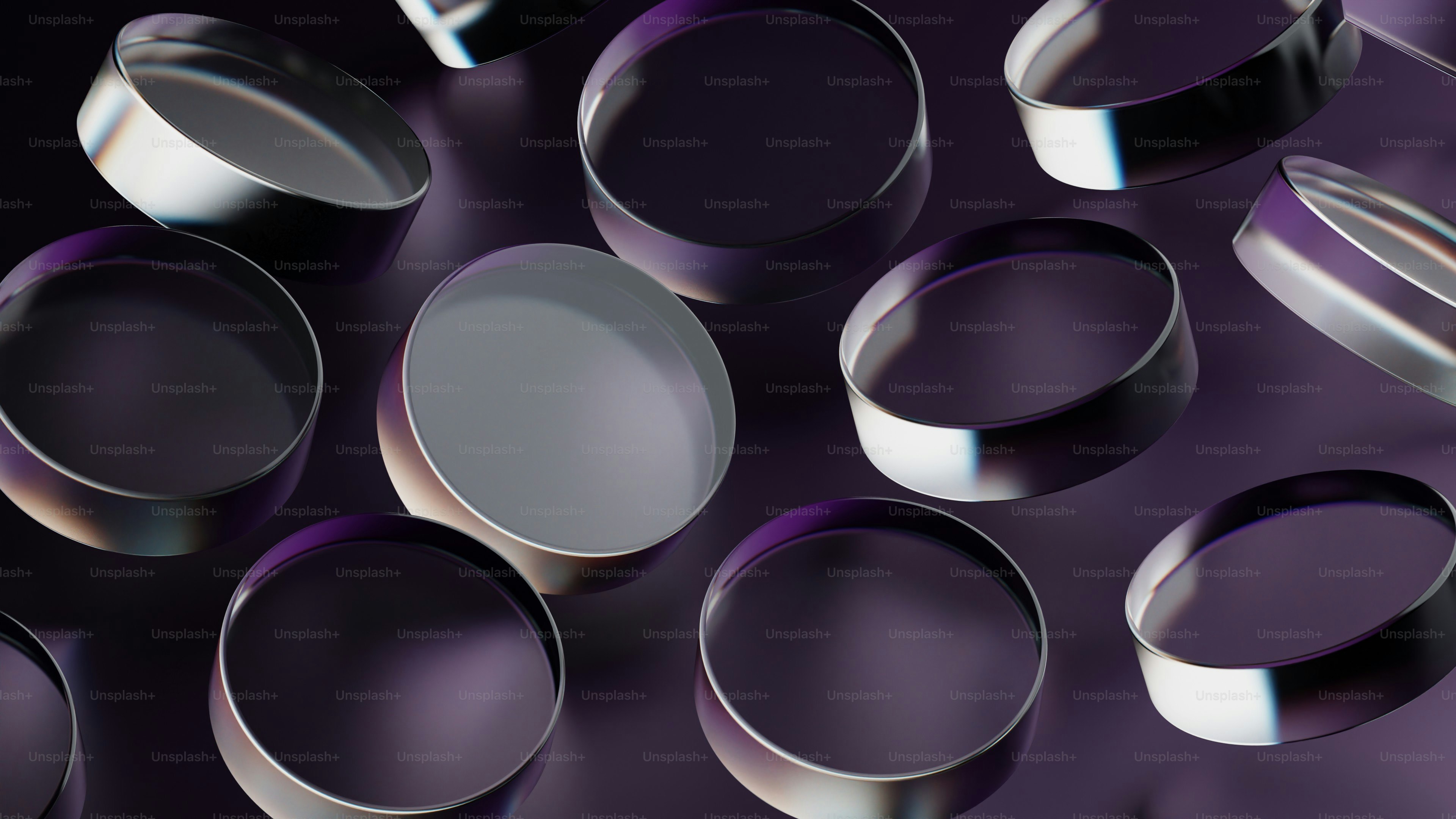 A bunch of shiny metal objects on a purple background photo – Wallpaper ...