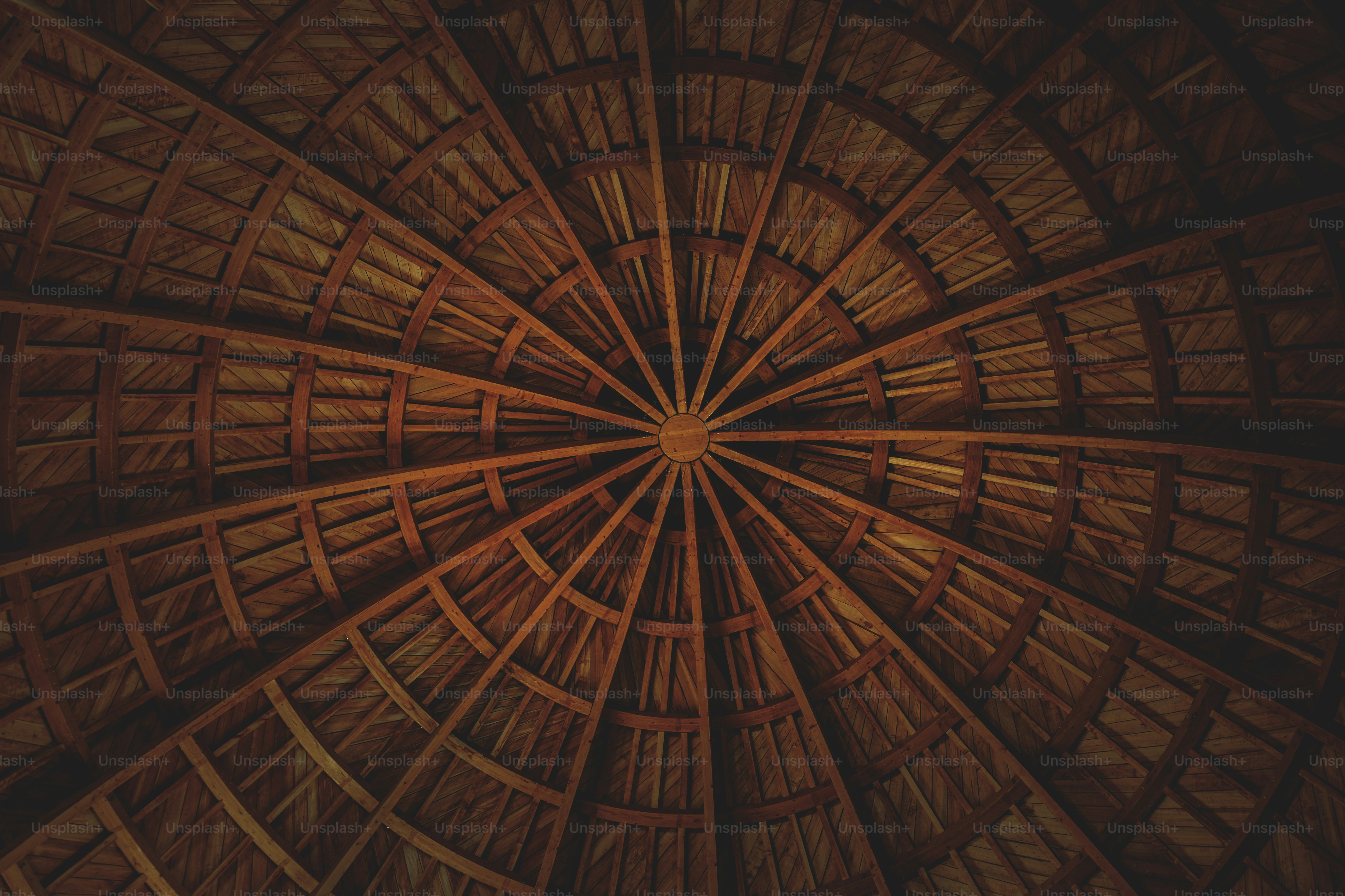 A close up of a circular wooden structure photo – Circular Image on ...