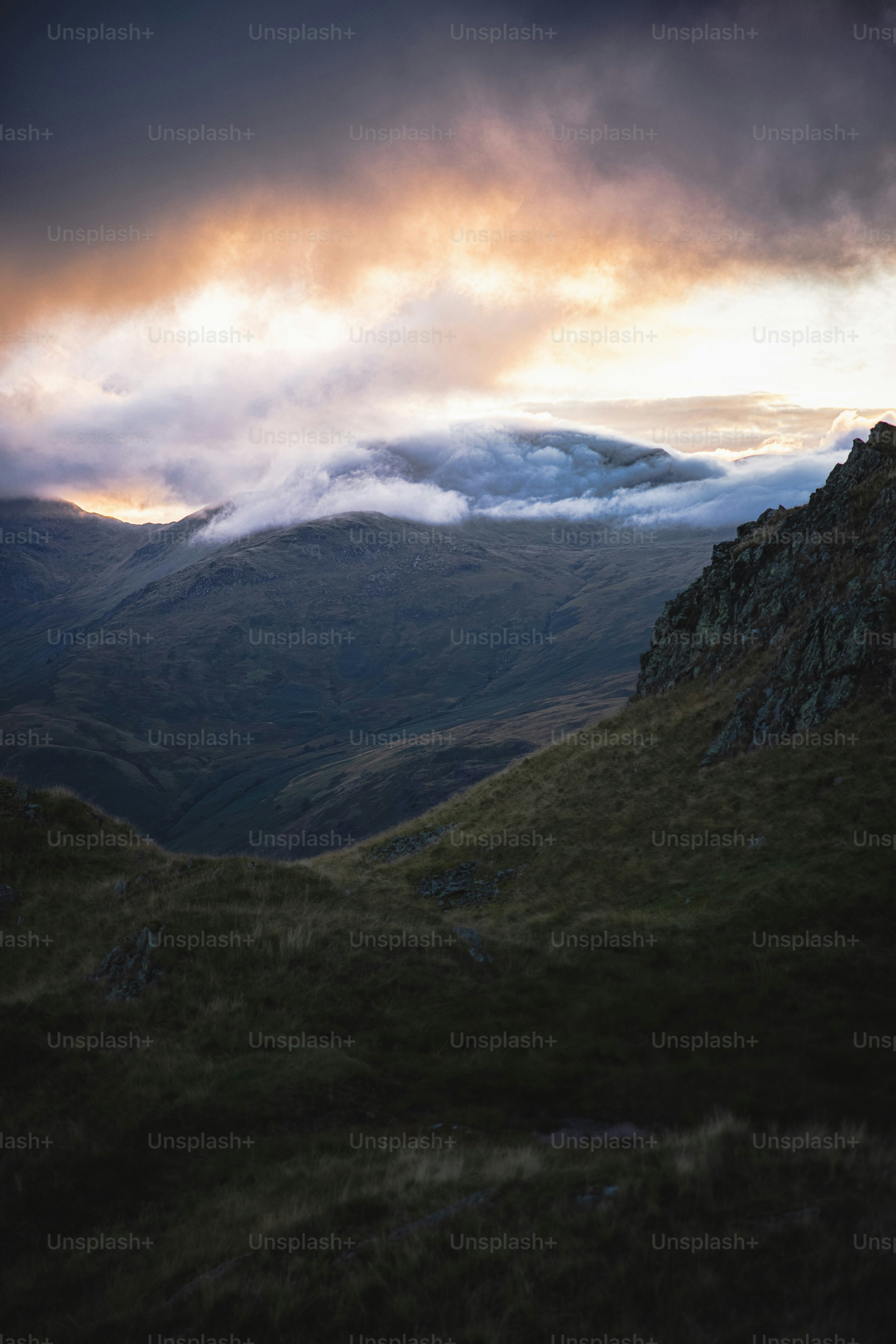 A view of a mountain with clouds in the sky photo – Outdoor Image on ...