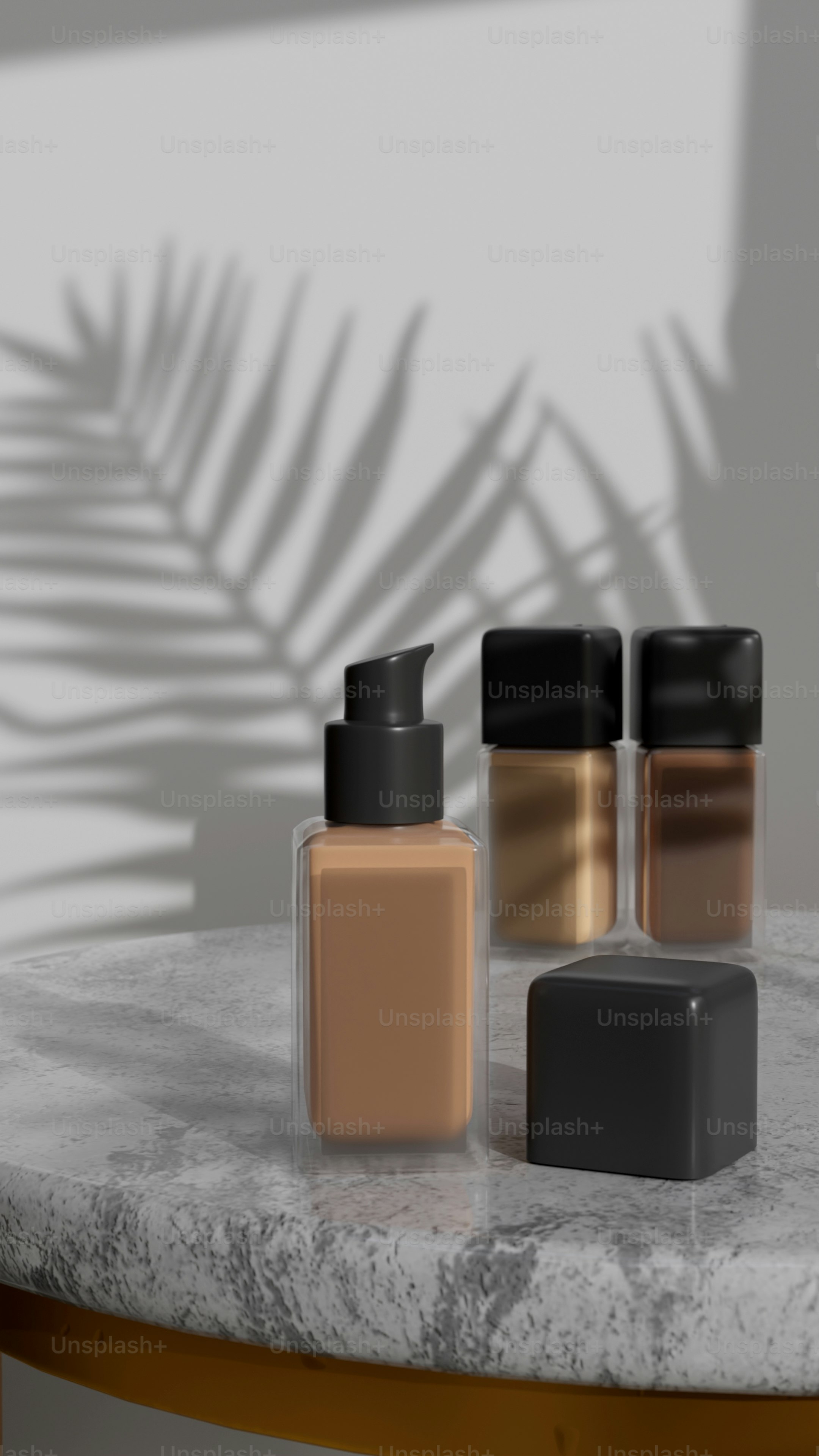 Three different shades of foundation on a marble table photo – Beauty ...