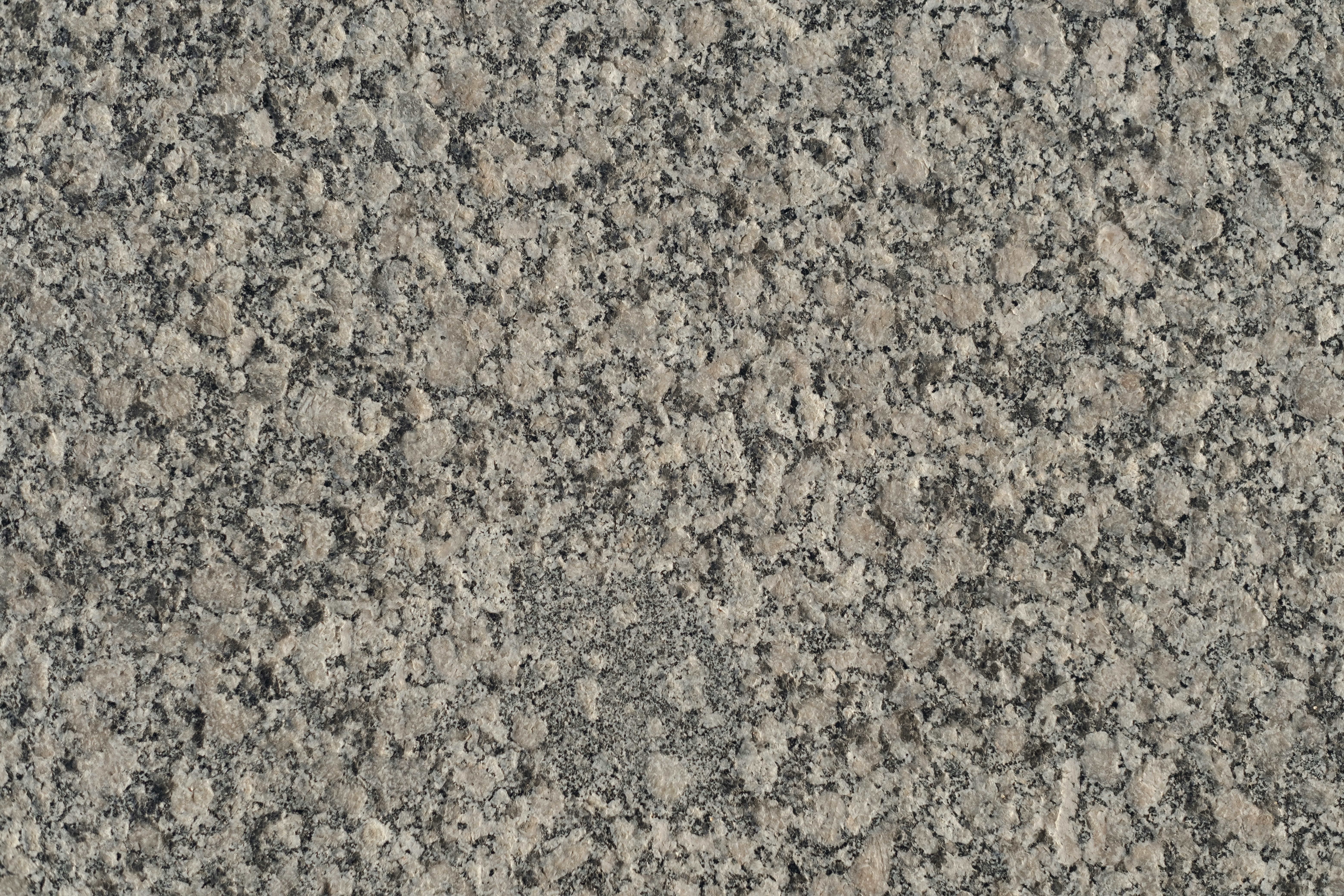 A close up view of a granite surface photo – Granite texture Image on ...