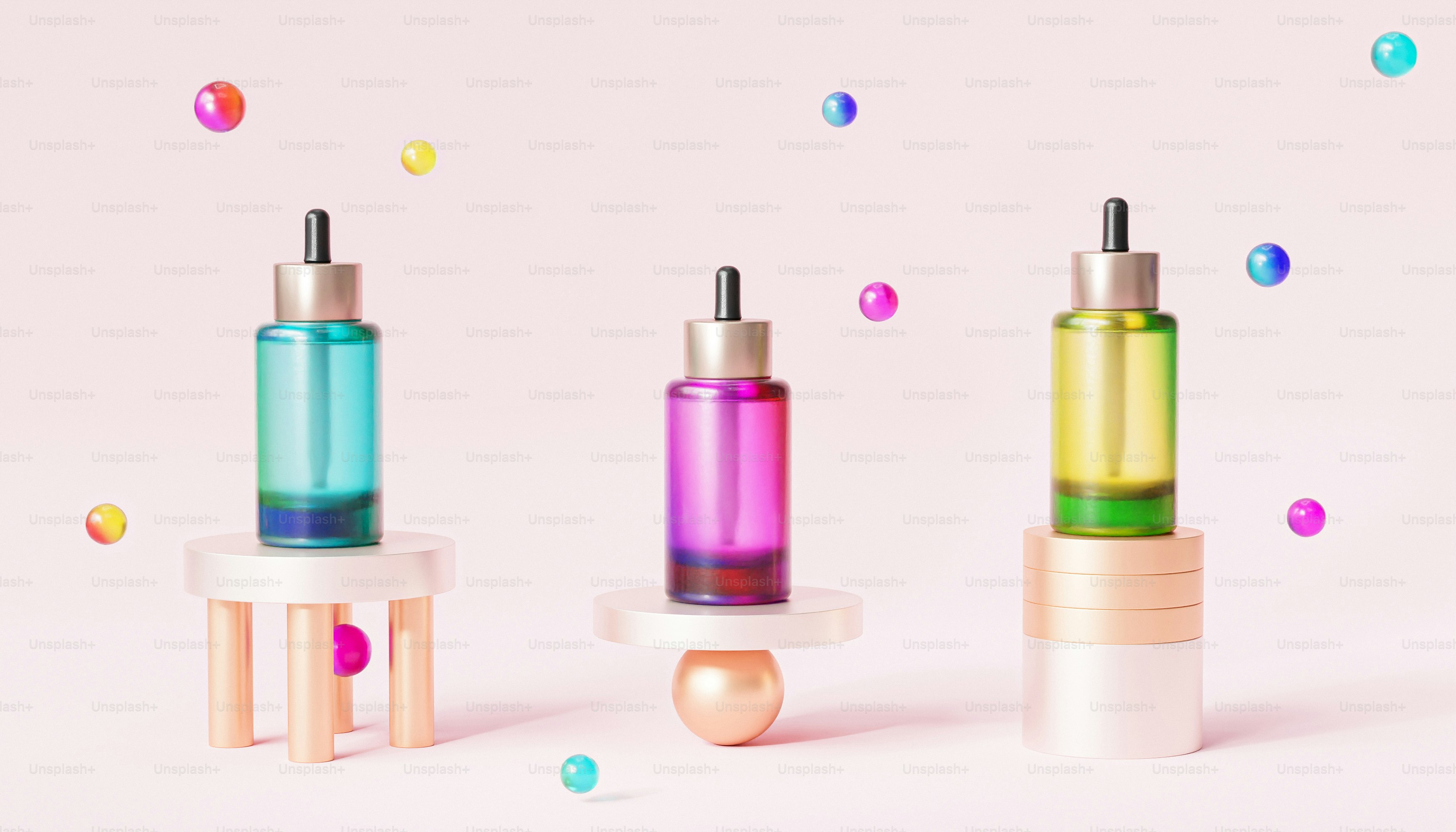 A group of three different colored items on a white surface photo ...