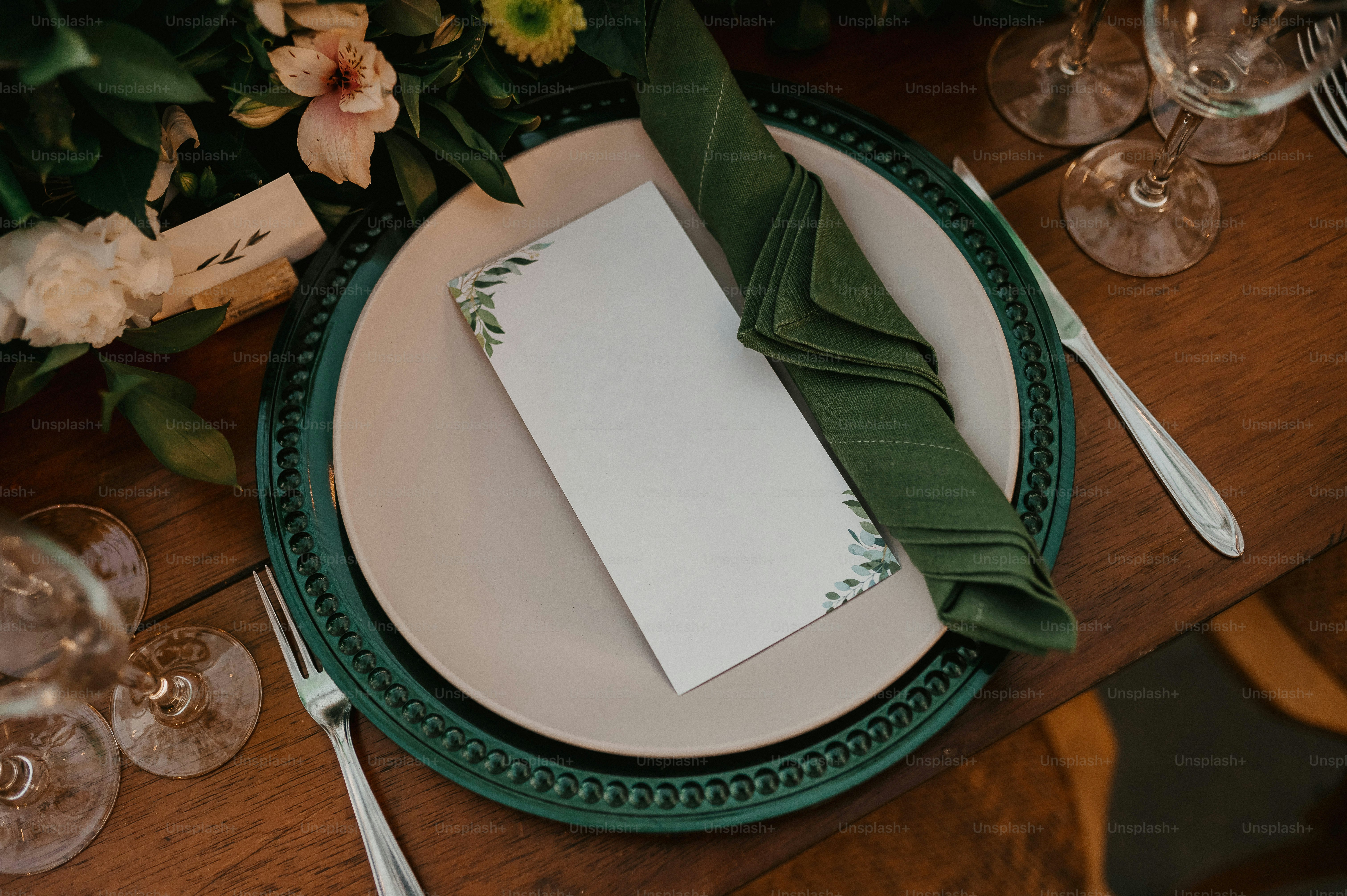 A close up of a plate with a napkin on it photo – Menu card Image on ...