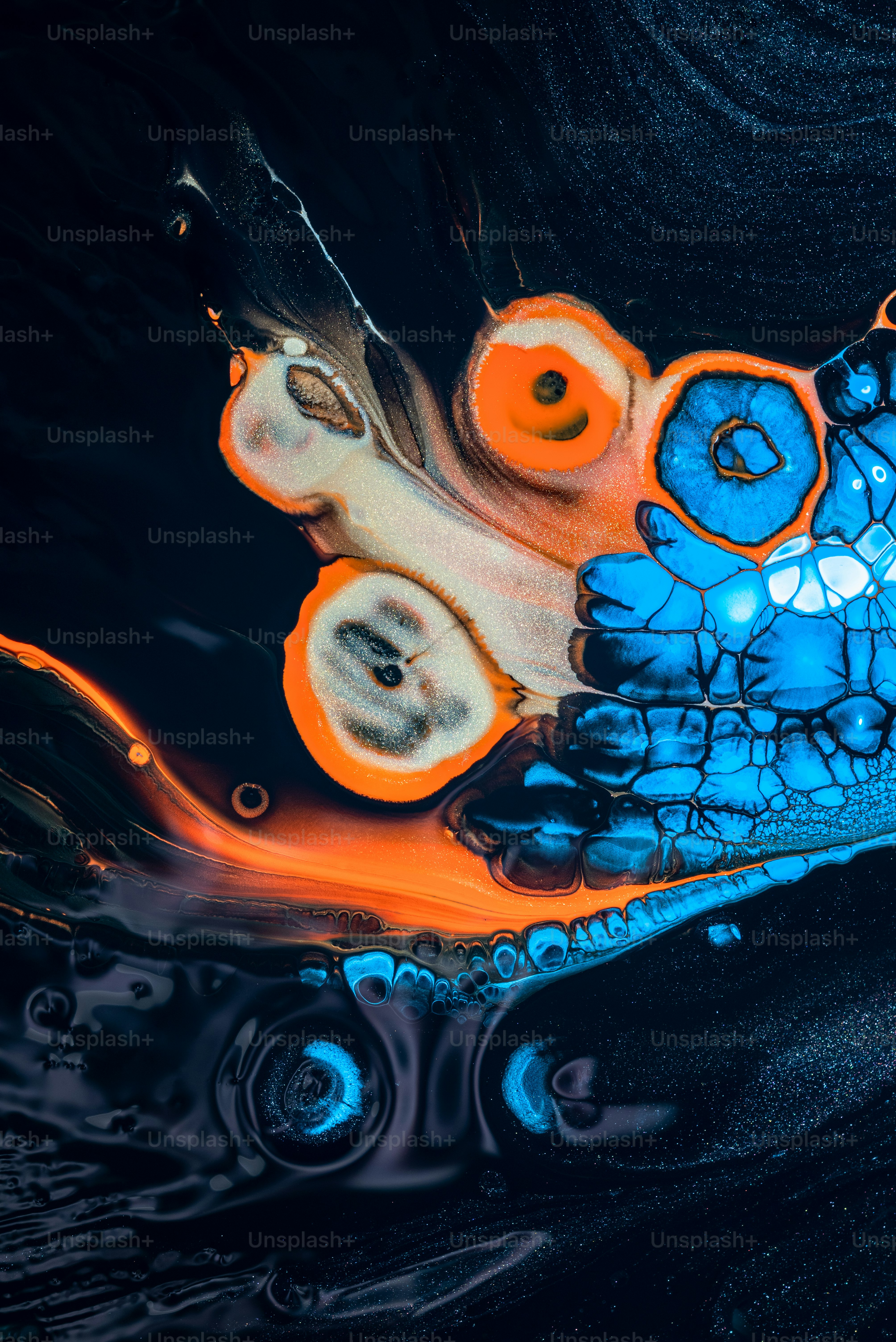 A close up of a blue and orange object photo – Orange Image on Unsplash