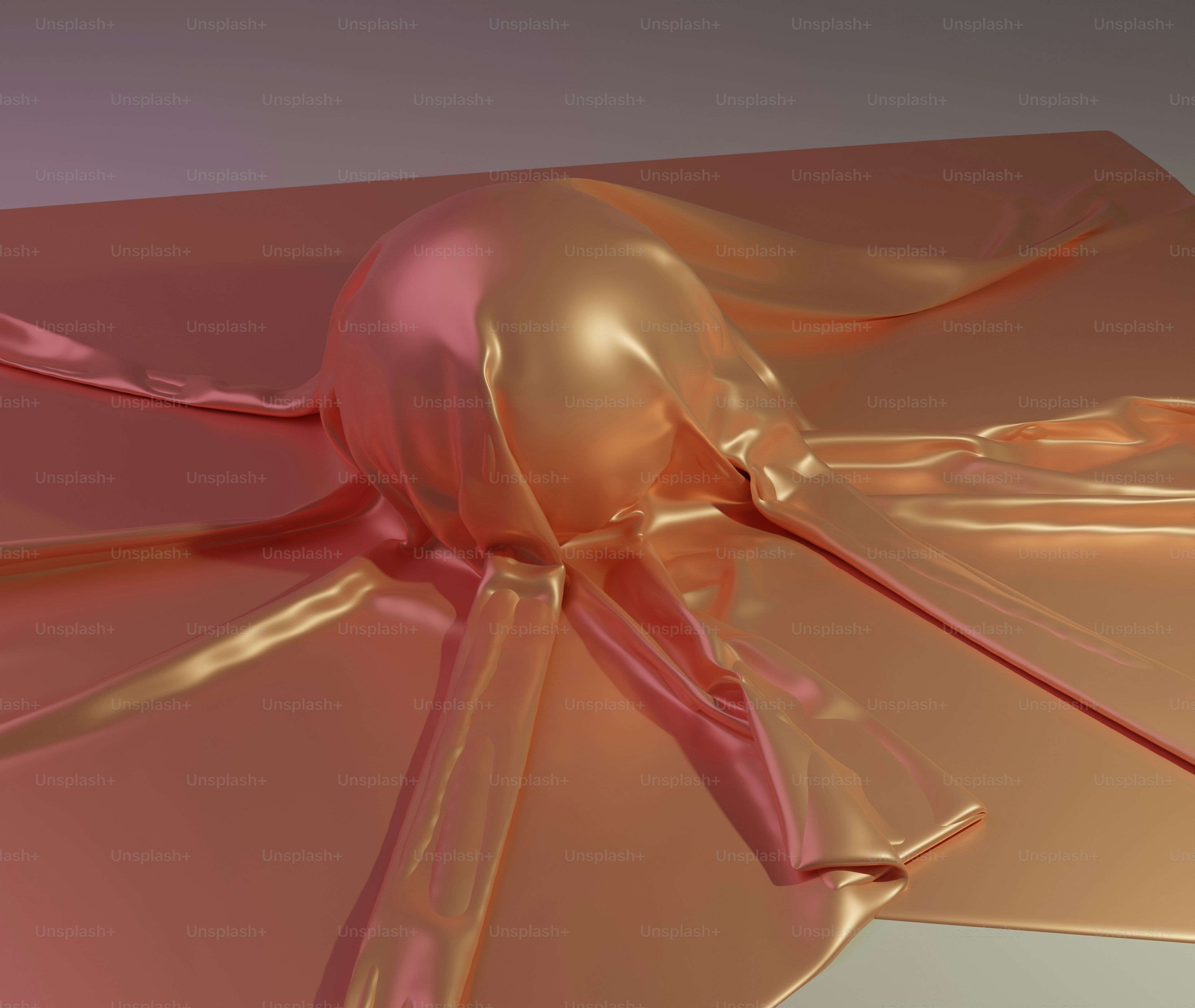 Un objet rose brillant avec un ruban rose autour de lui photo ...