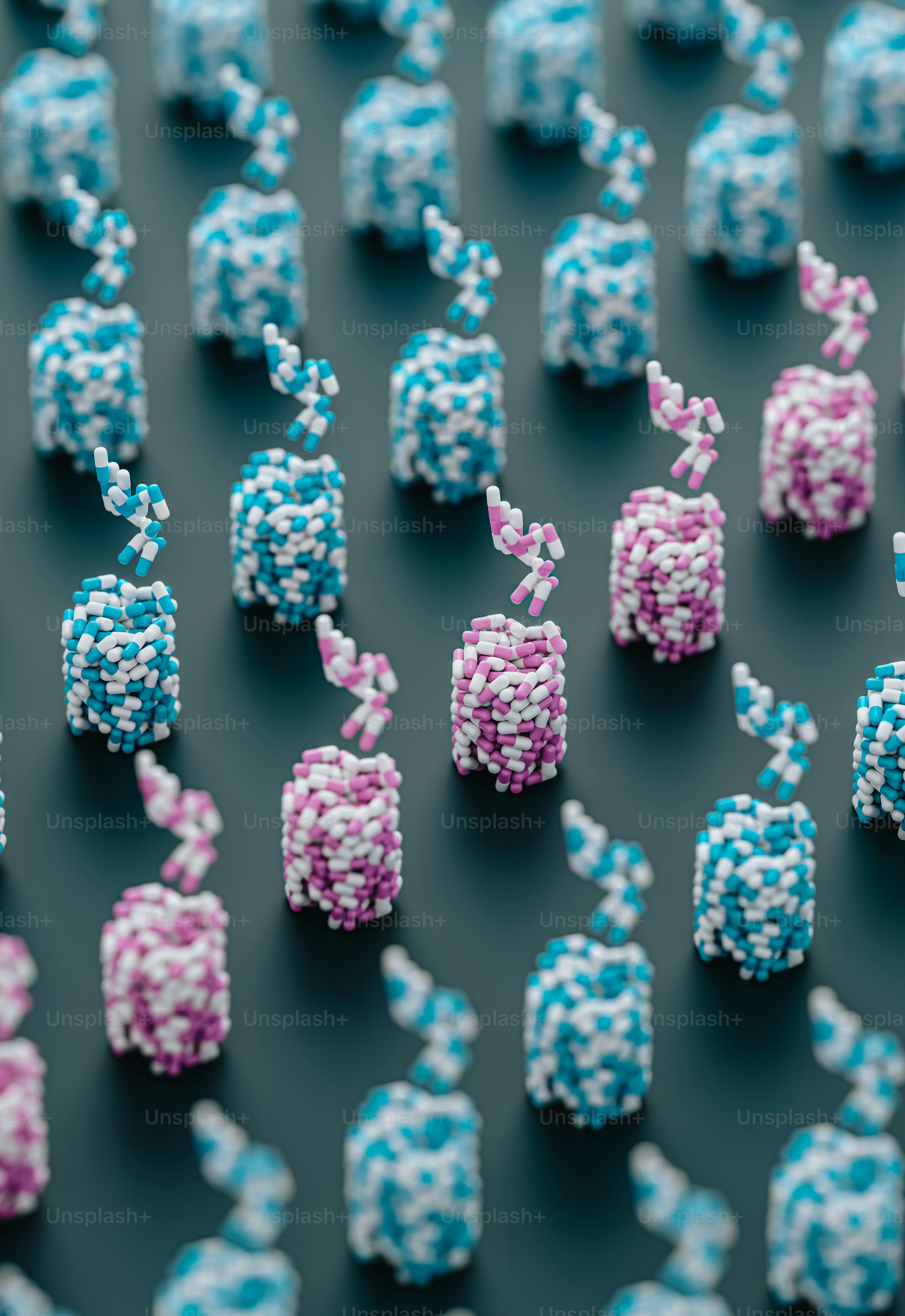 A large group of small blue and pink objects photo – Healthcare Image ...