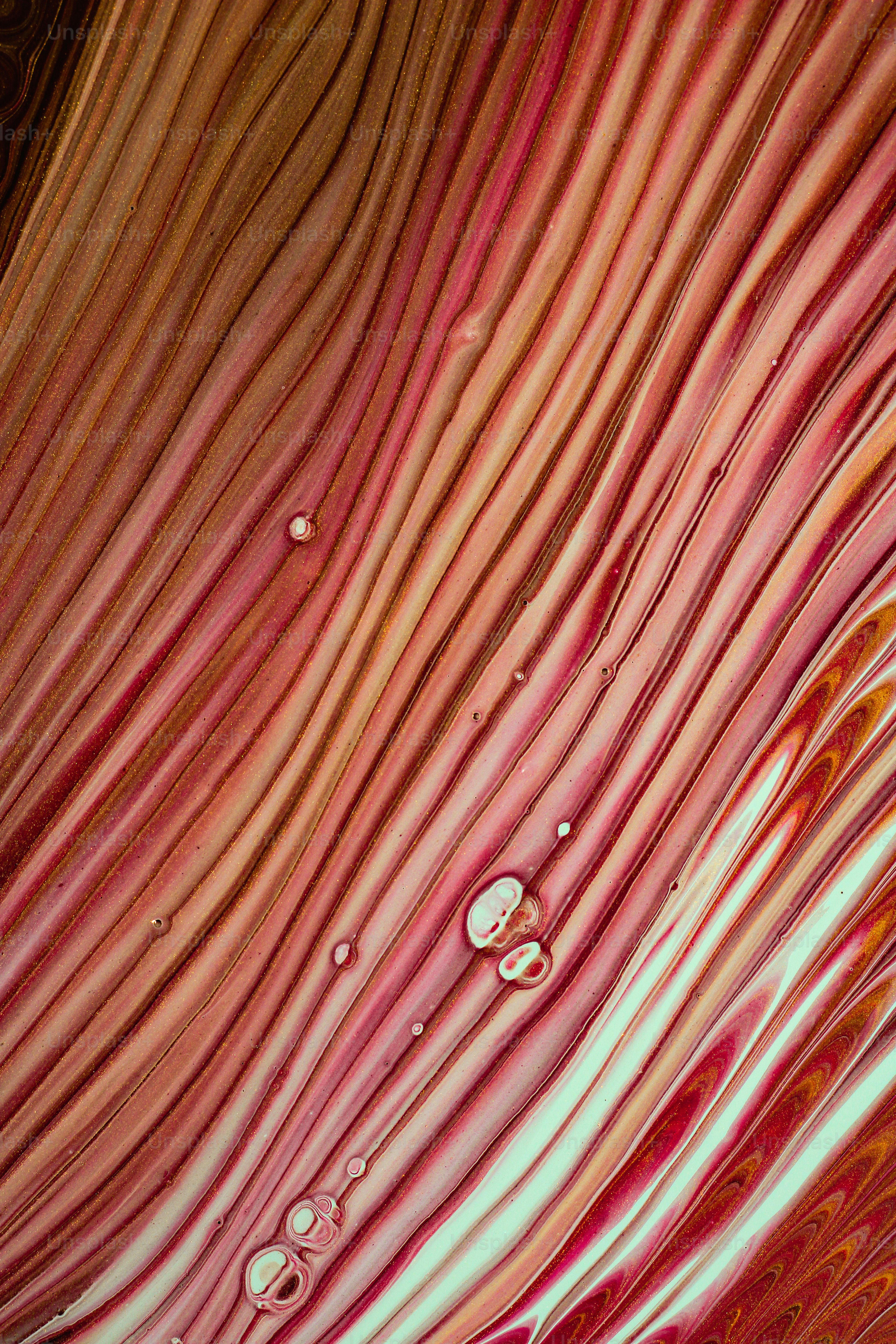 A close up of a red and yellow object photo – Screensaver Image on Unsplash