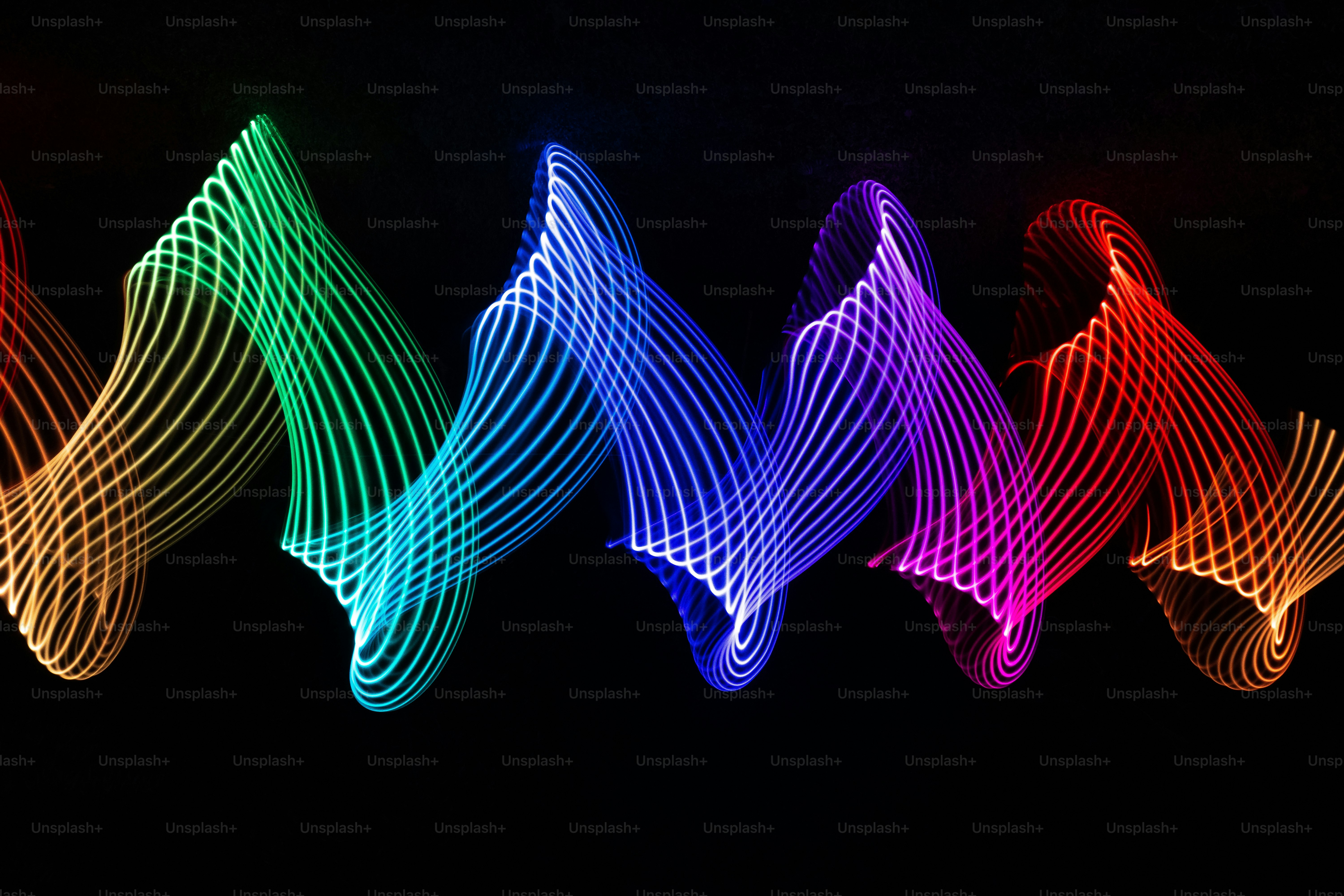A group of different colored lights in the dark photo – Multi coloured ...