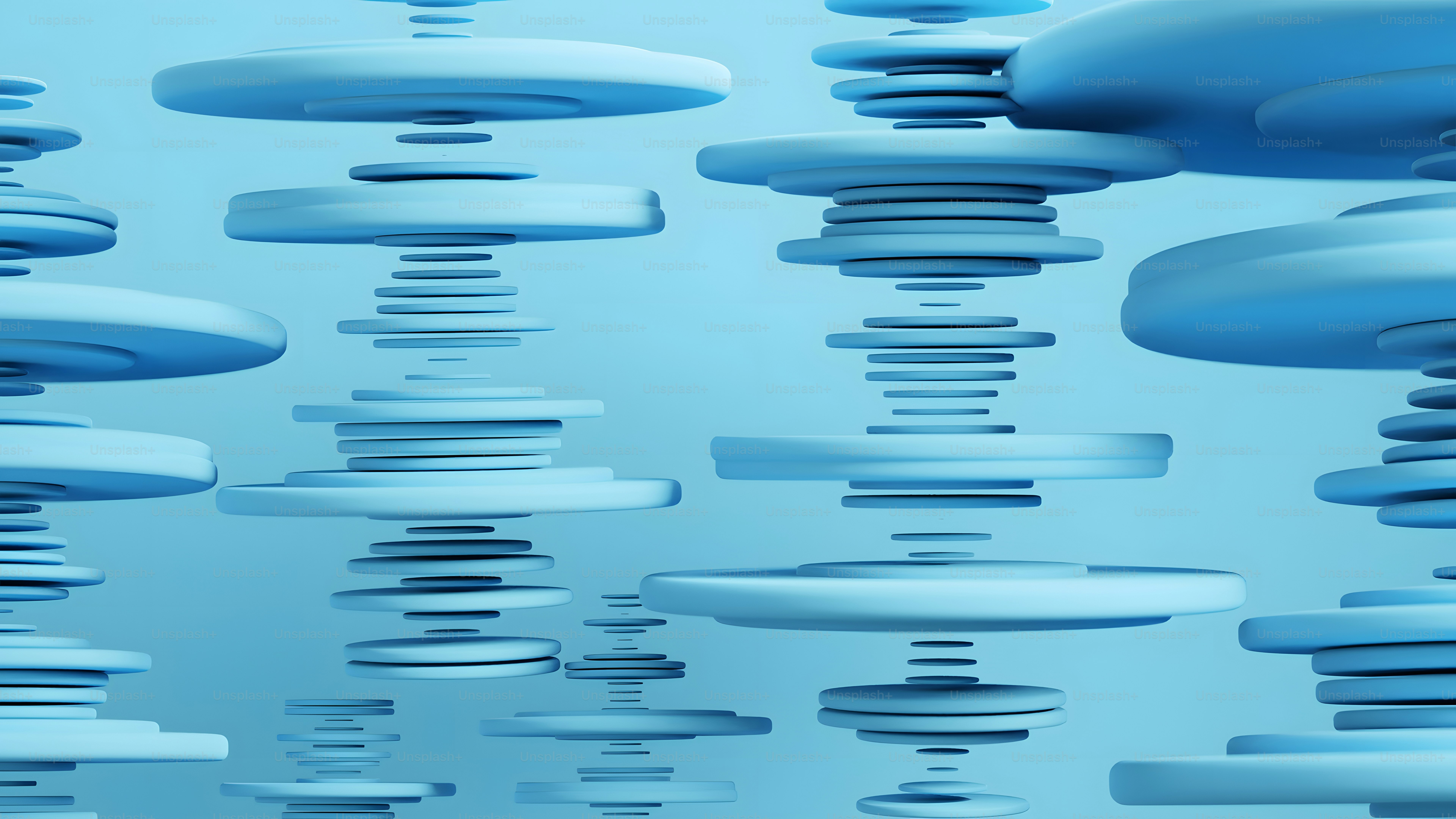 A group of blue objects floating in the air photo – Screen saver Image ...