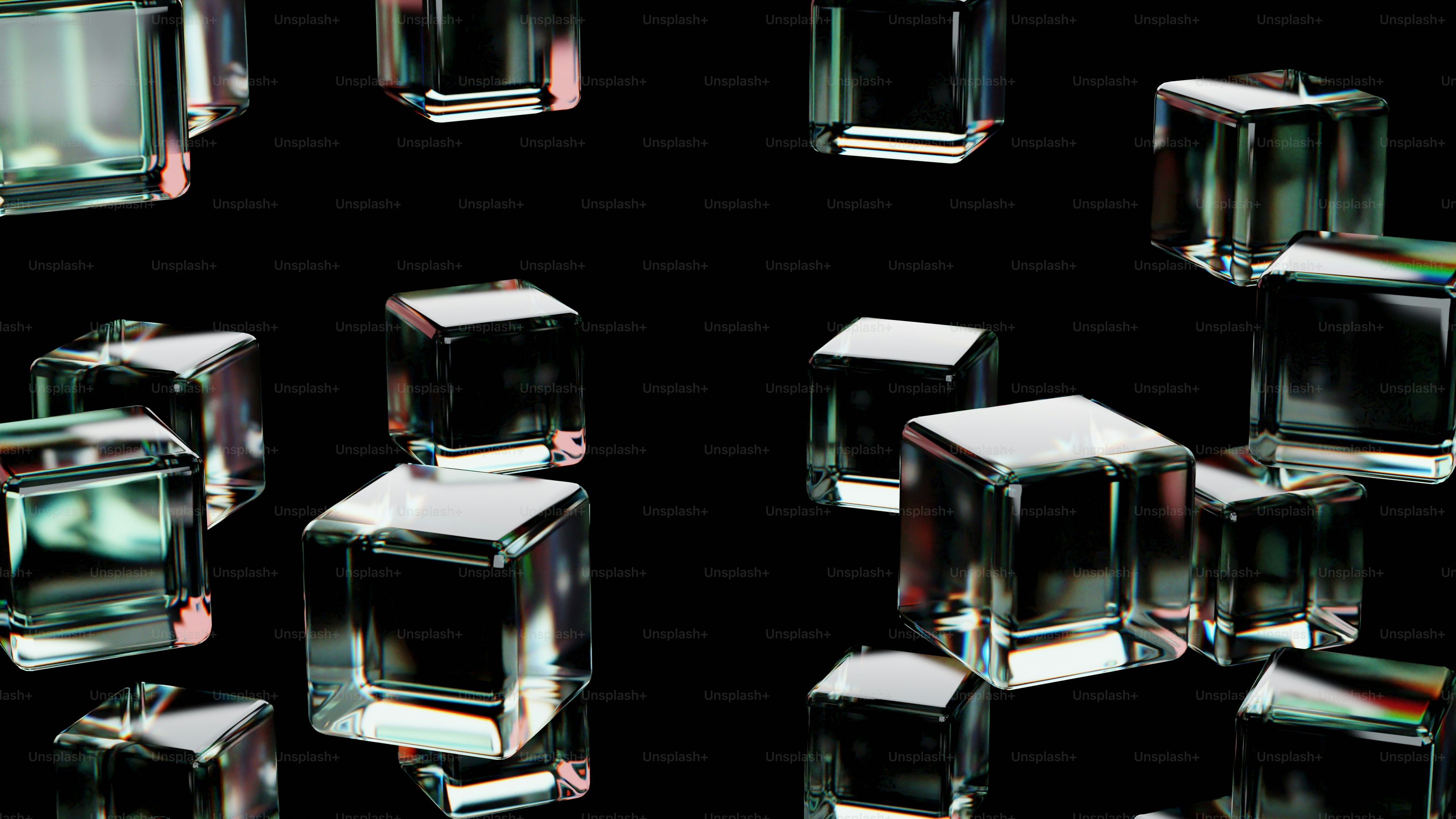 A group of glass cubes on a black background photo – Cubes Image on ...