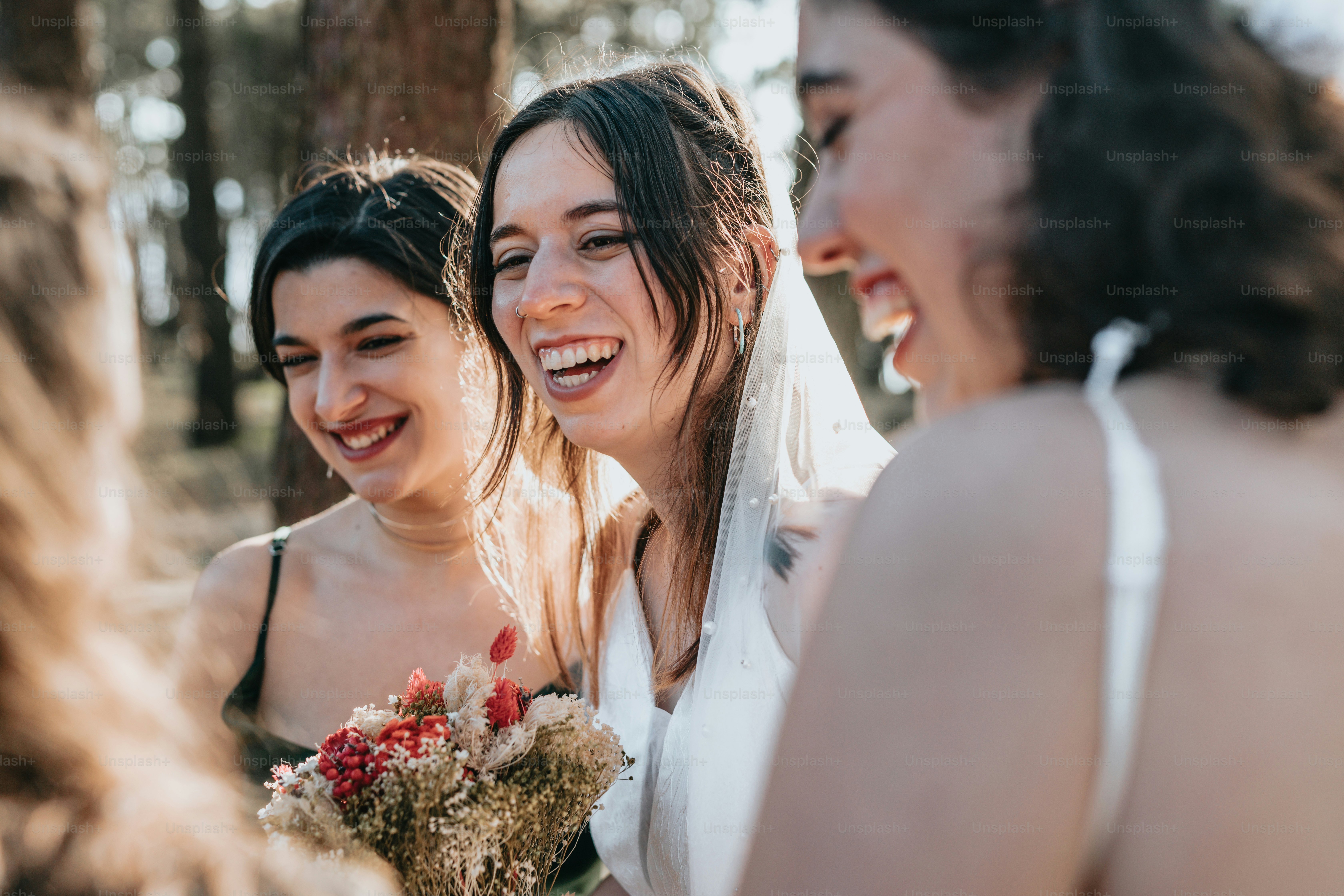 A group of women standing next to each other photo – Same sex couple ...