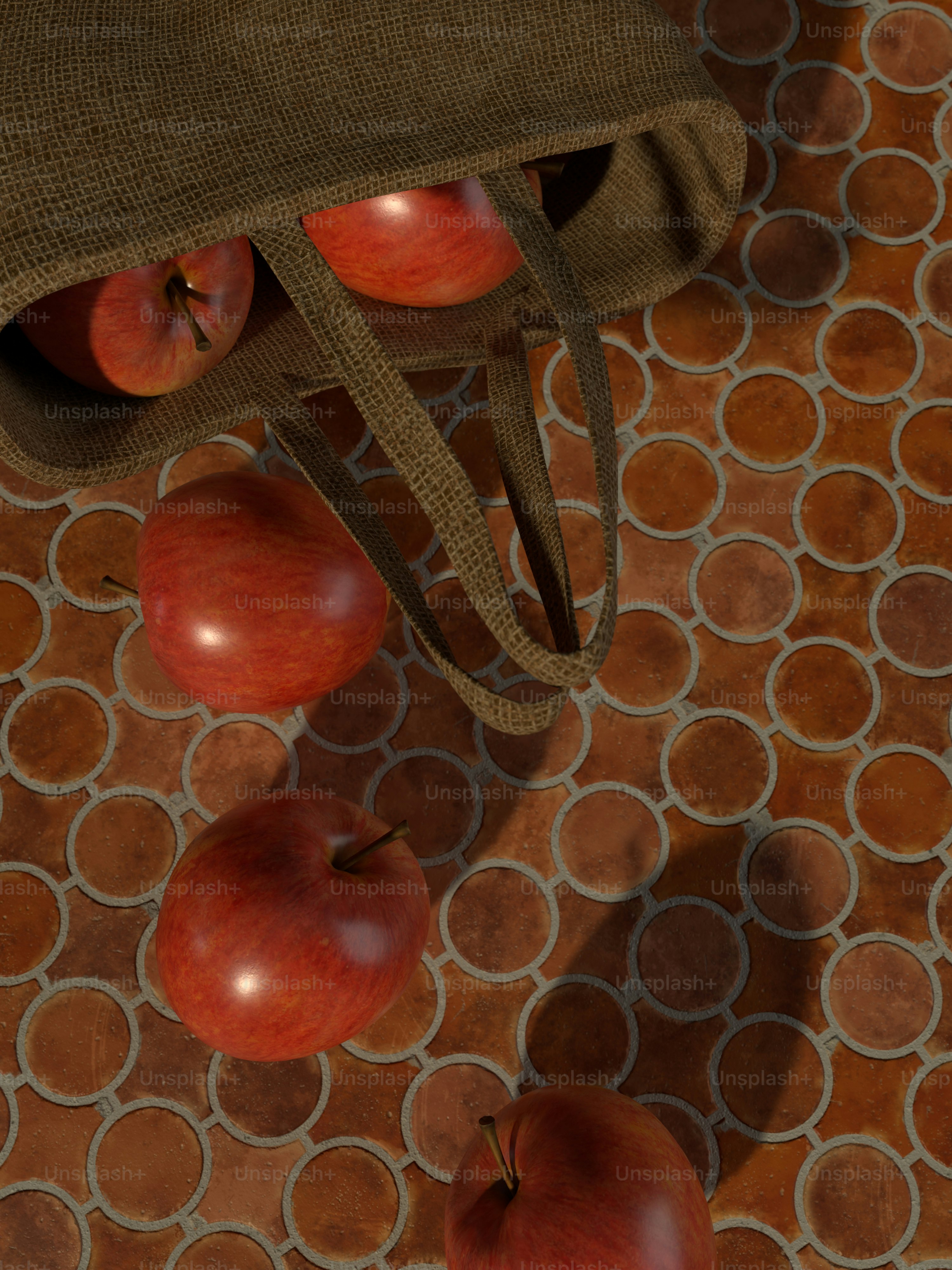 A group of apples sitting on top of a tiled floor photo – Bag Image on ...