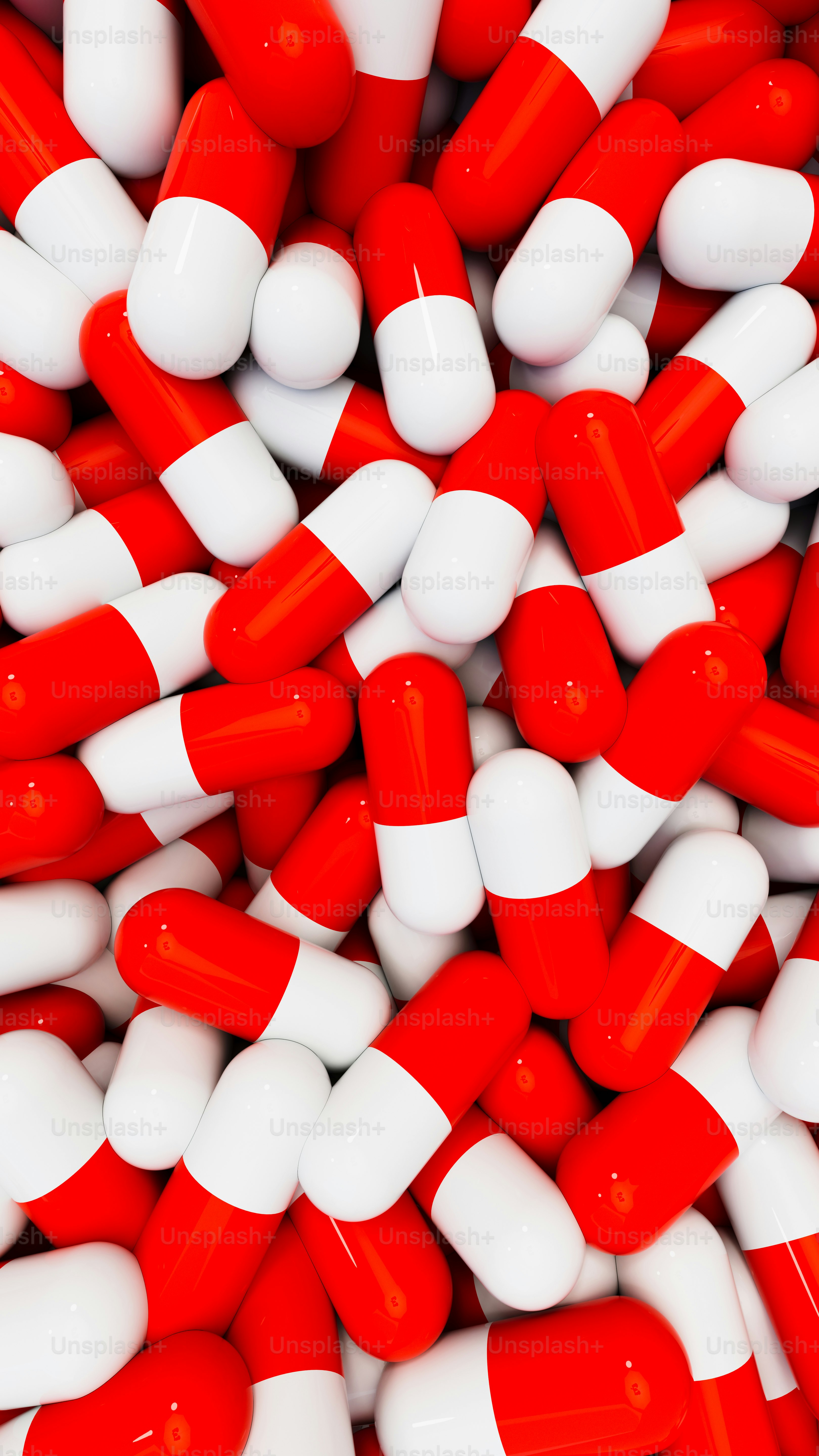A pile of red and white pills photo – Antibiotics Image on Unsplash