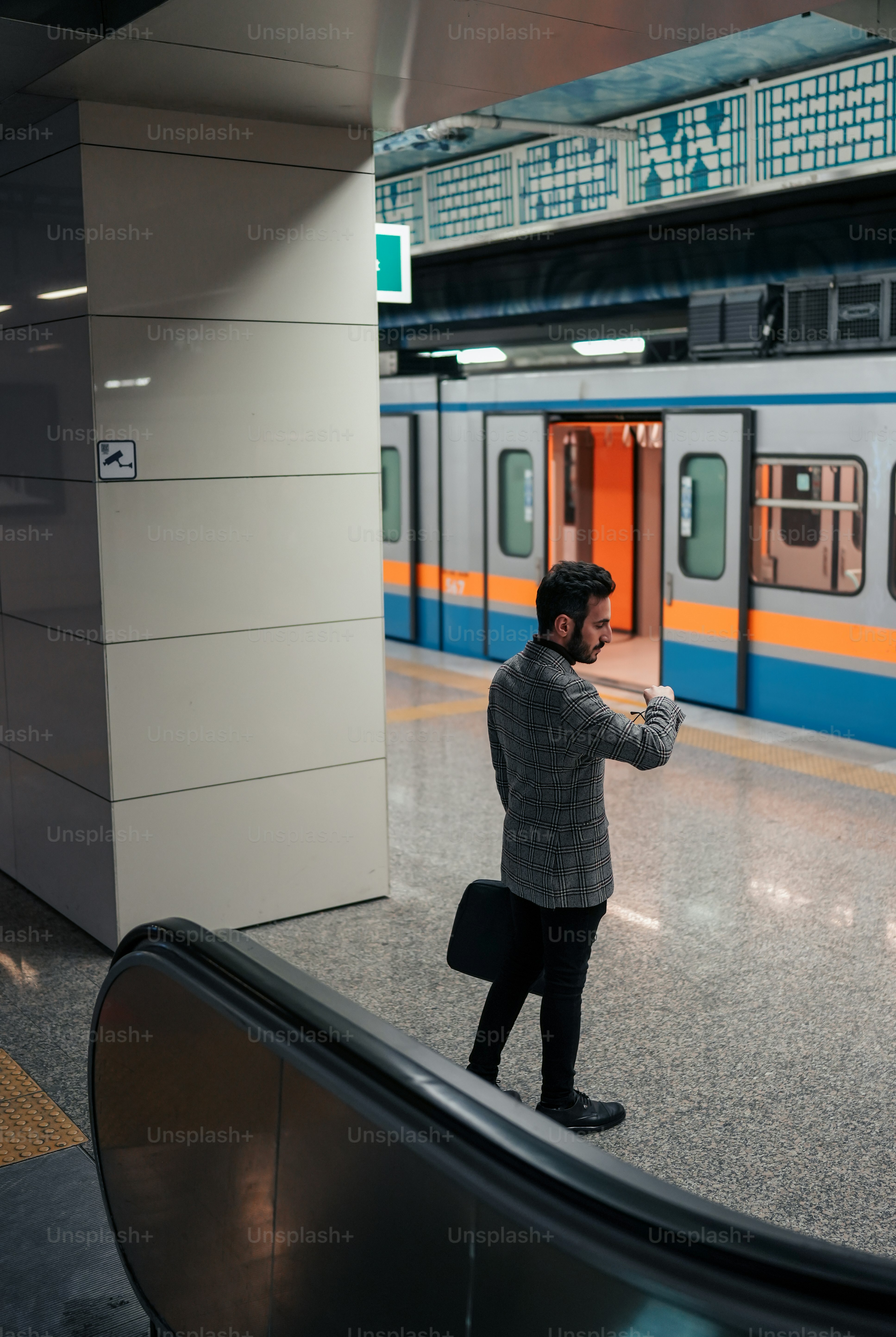 A view of a train from inside a train car photo – Train tracks Image on ...