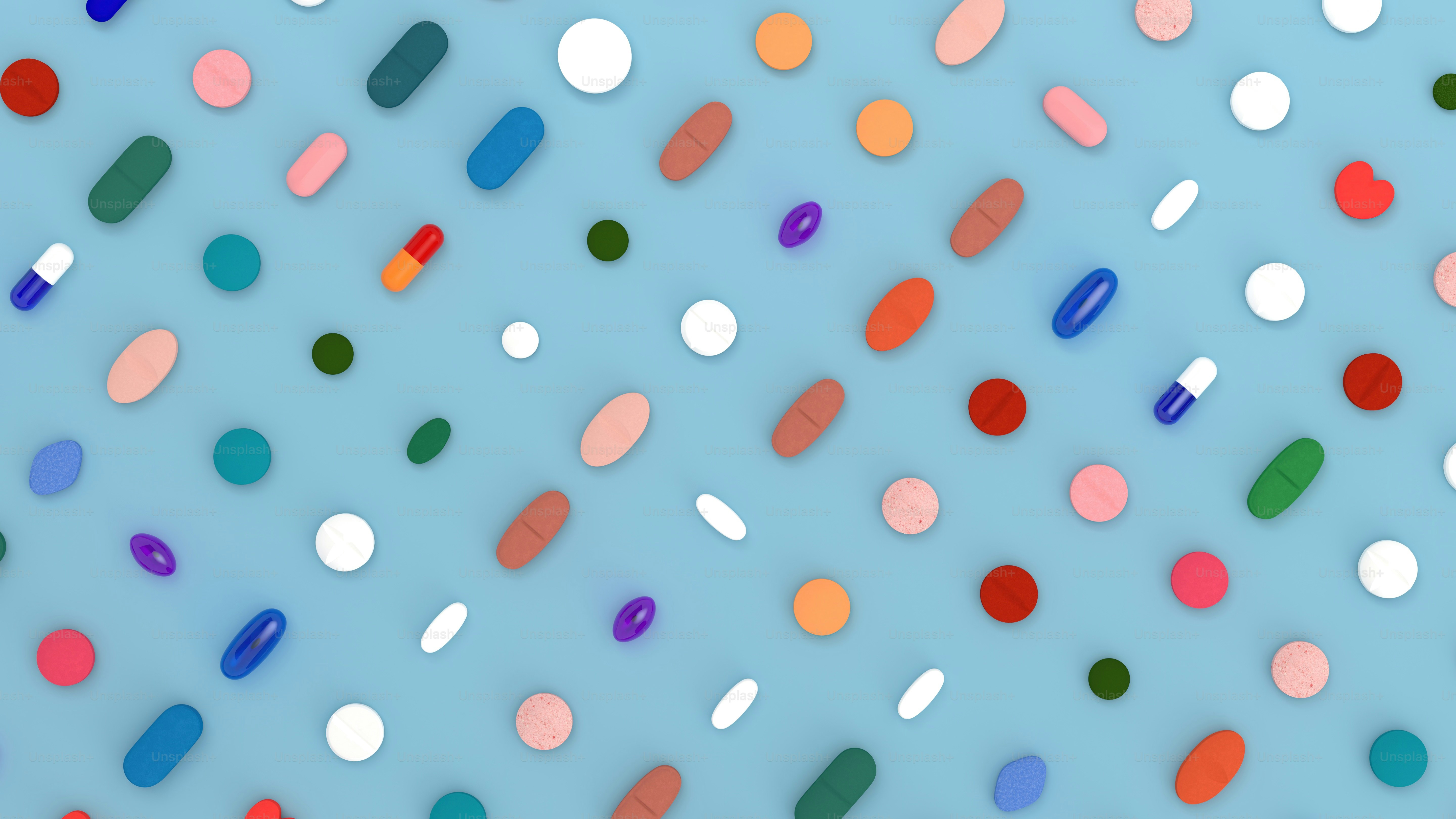 Multicolored confetti on a blue background photo – Health Image on Unsplash