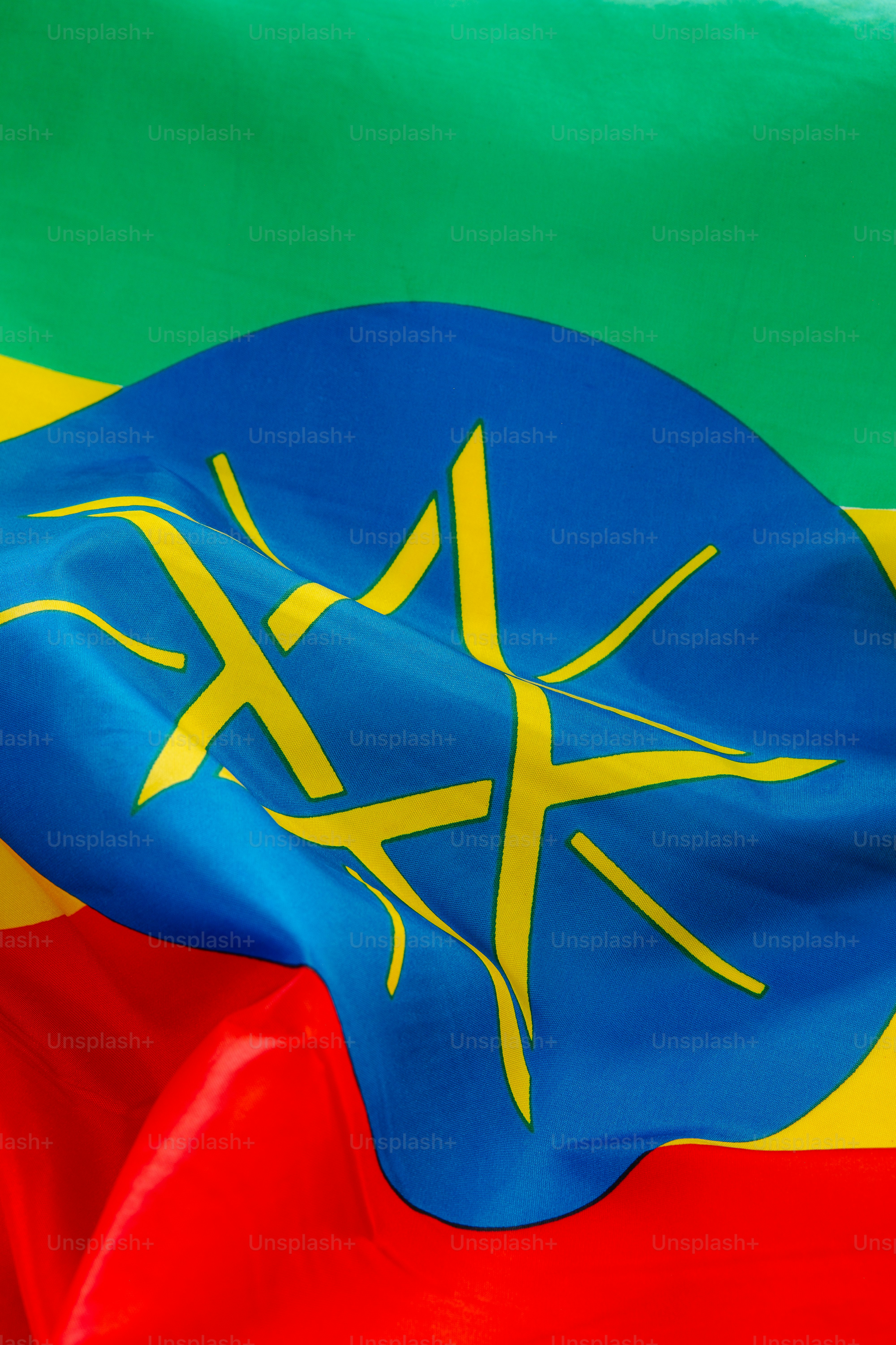 A close up of a flag with a cross on it photo – Flag Image on Unsplash
