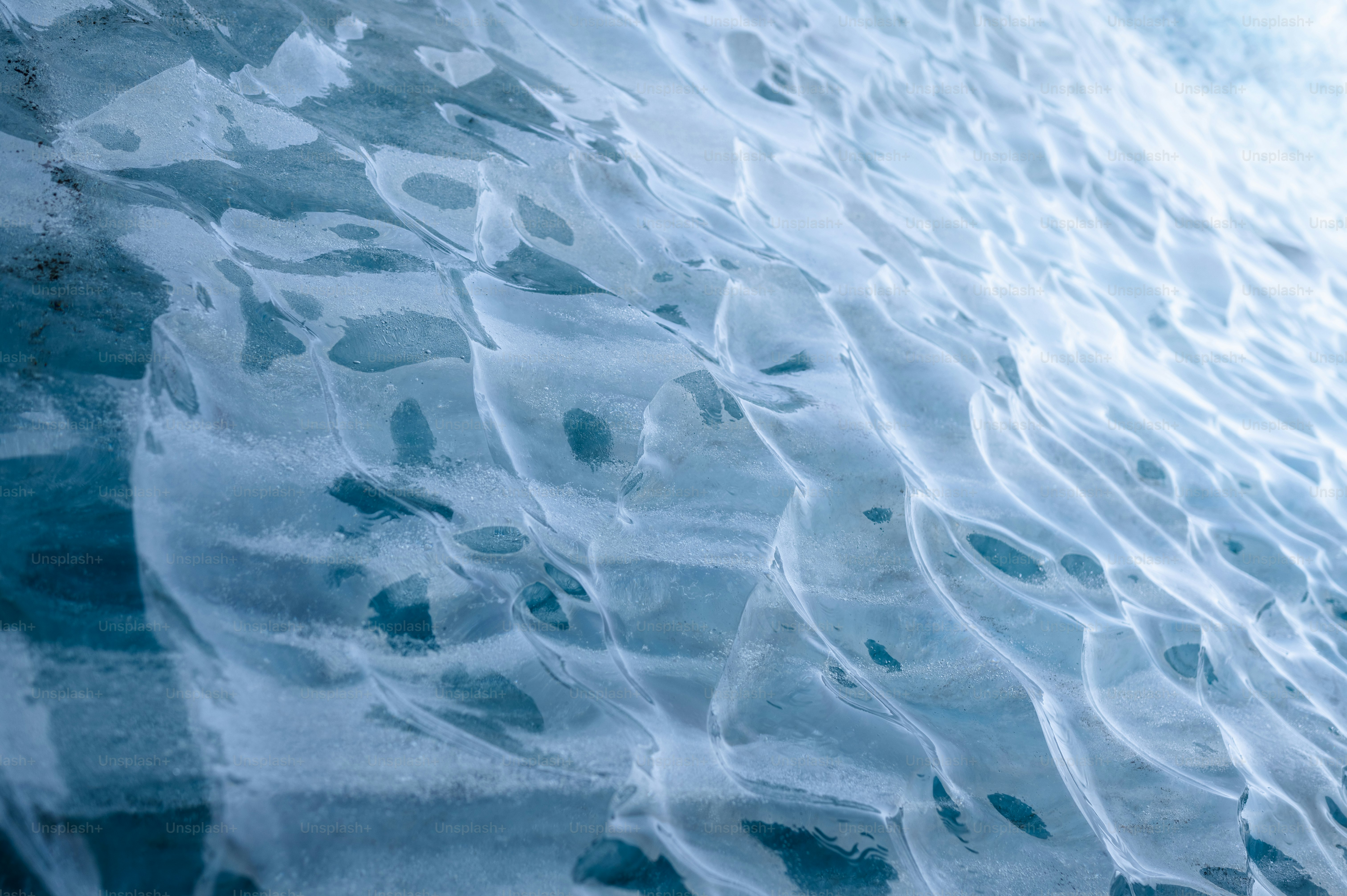 A large amount of ice on the side of a mountain photo – Aesthetic blue ...