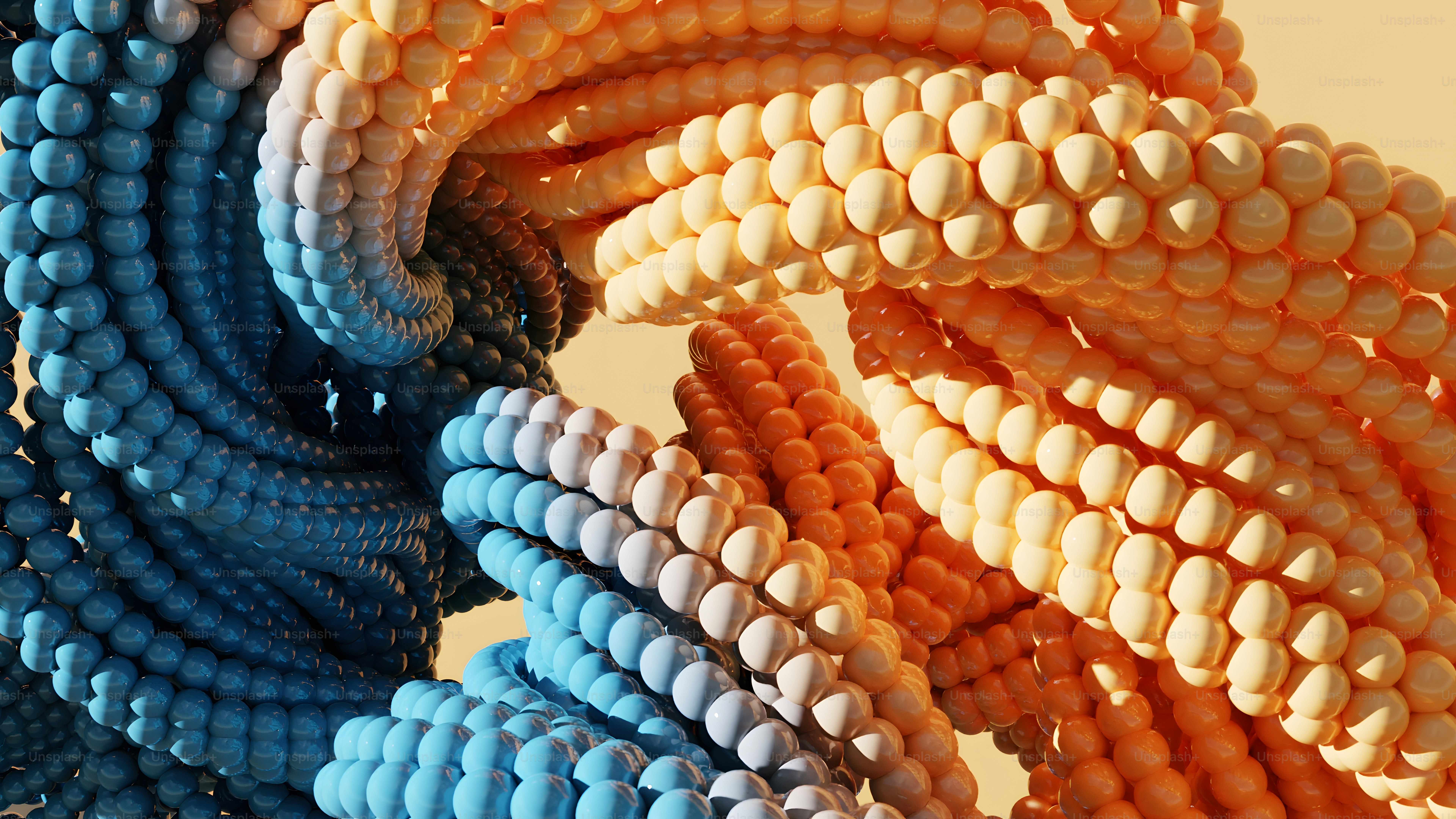 A close up of a bunch of beads photo – Orange blue Image on Unsplash