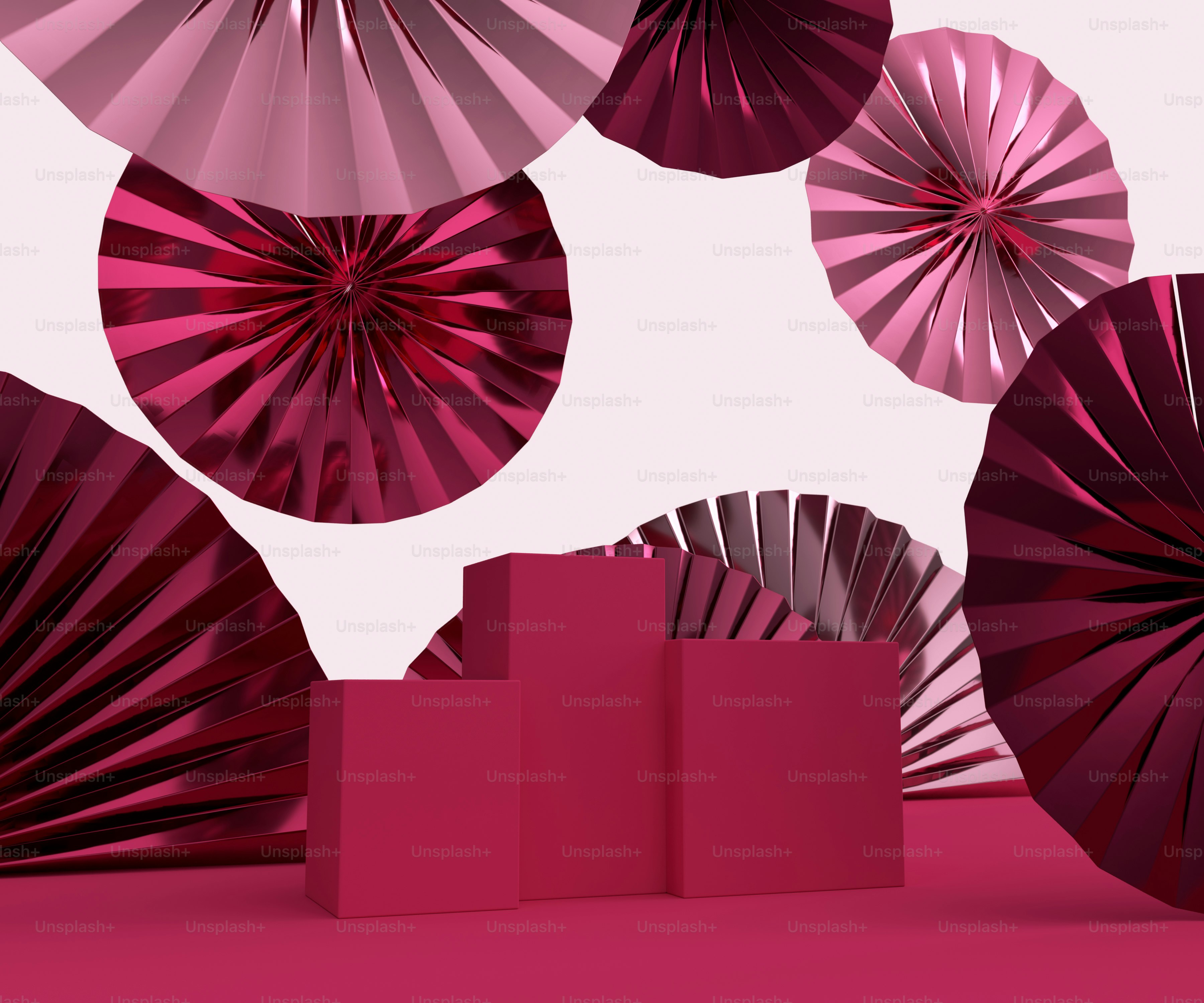 A group of pink fans sitting next to each other photo – Magenta ...