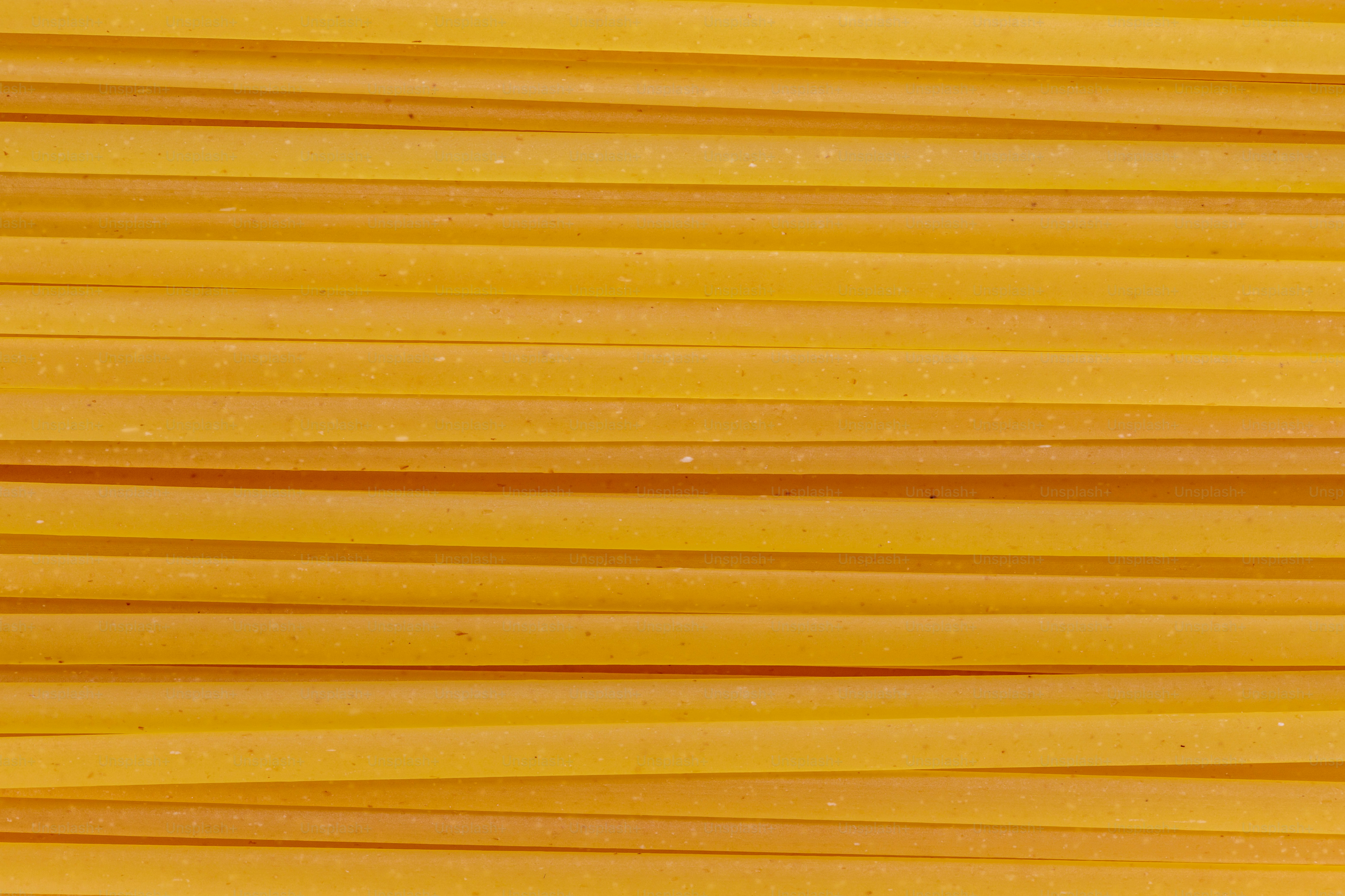 A close up of a bunch of yellow pasta photo – Food Image on Unsplash