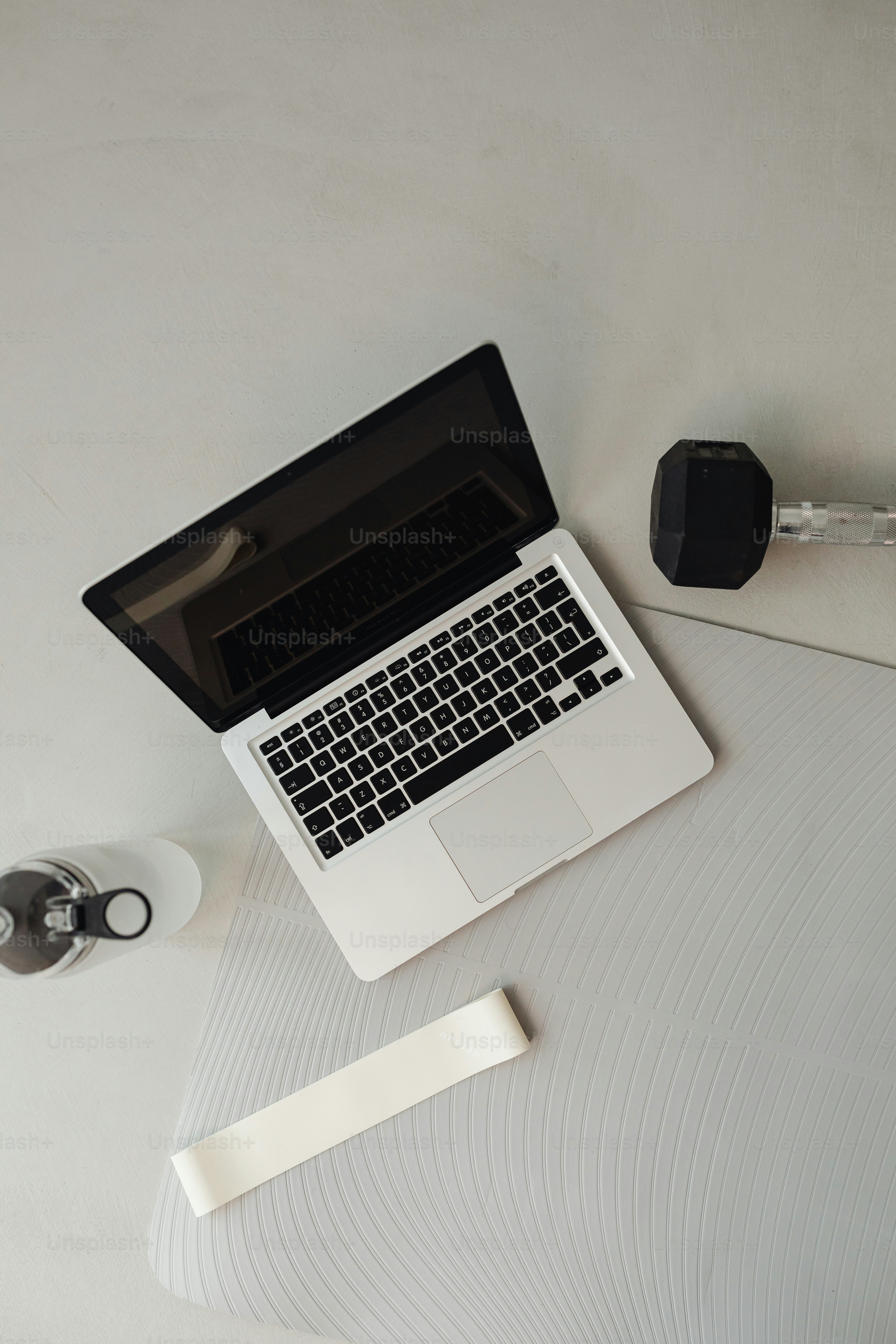 A laptop computer sitting on top of a table photo – Exercise Image on ...