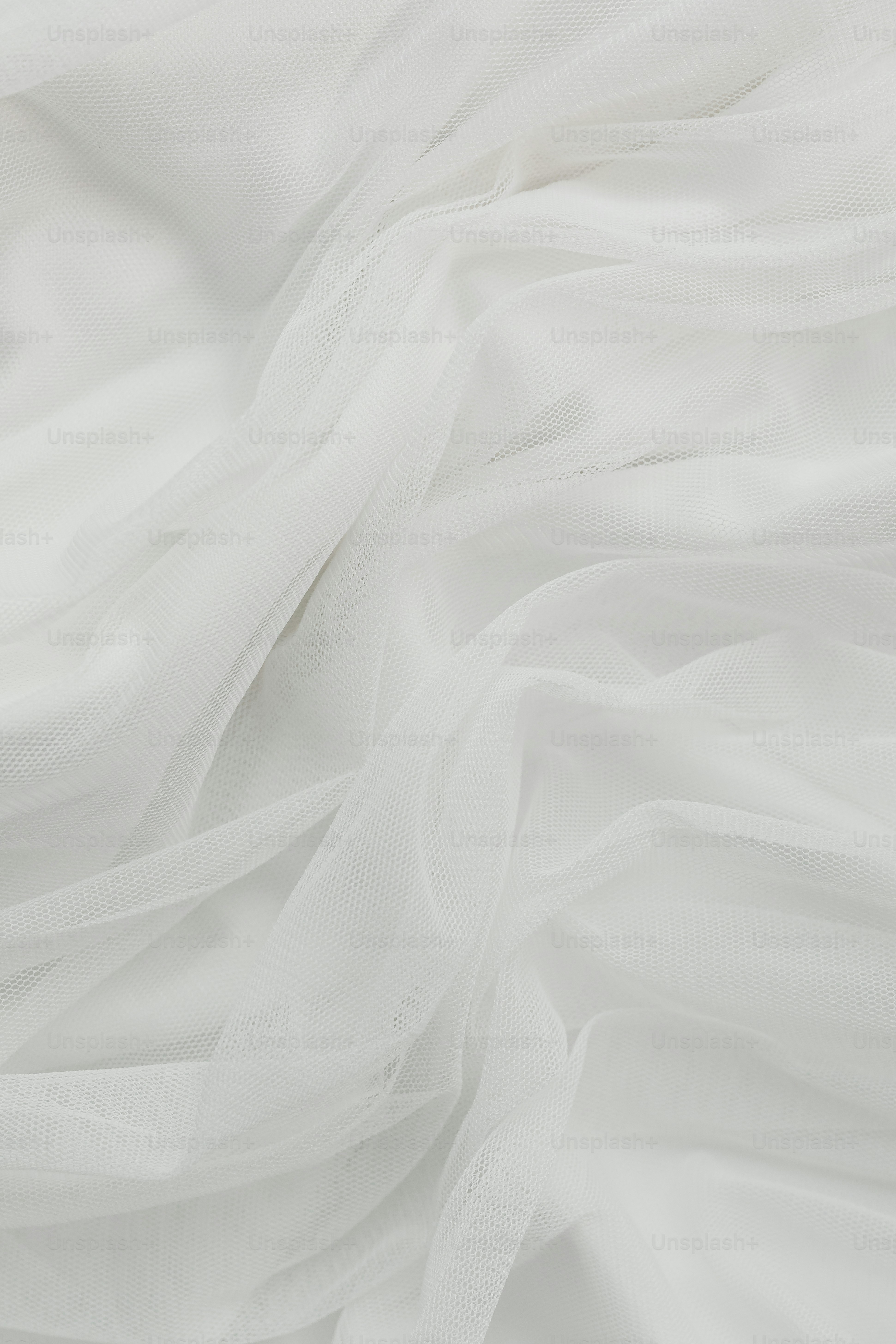 A close up of a white sheer fabric photo – White backgrounds Image on ...