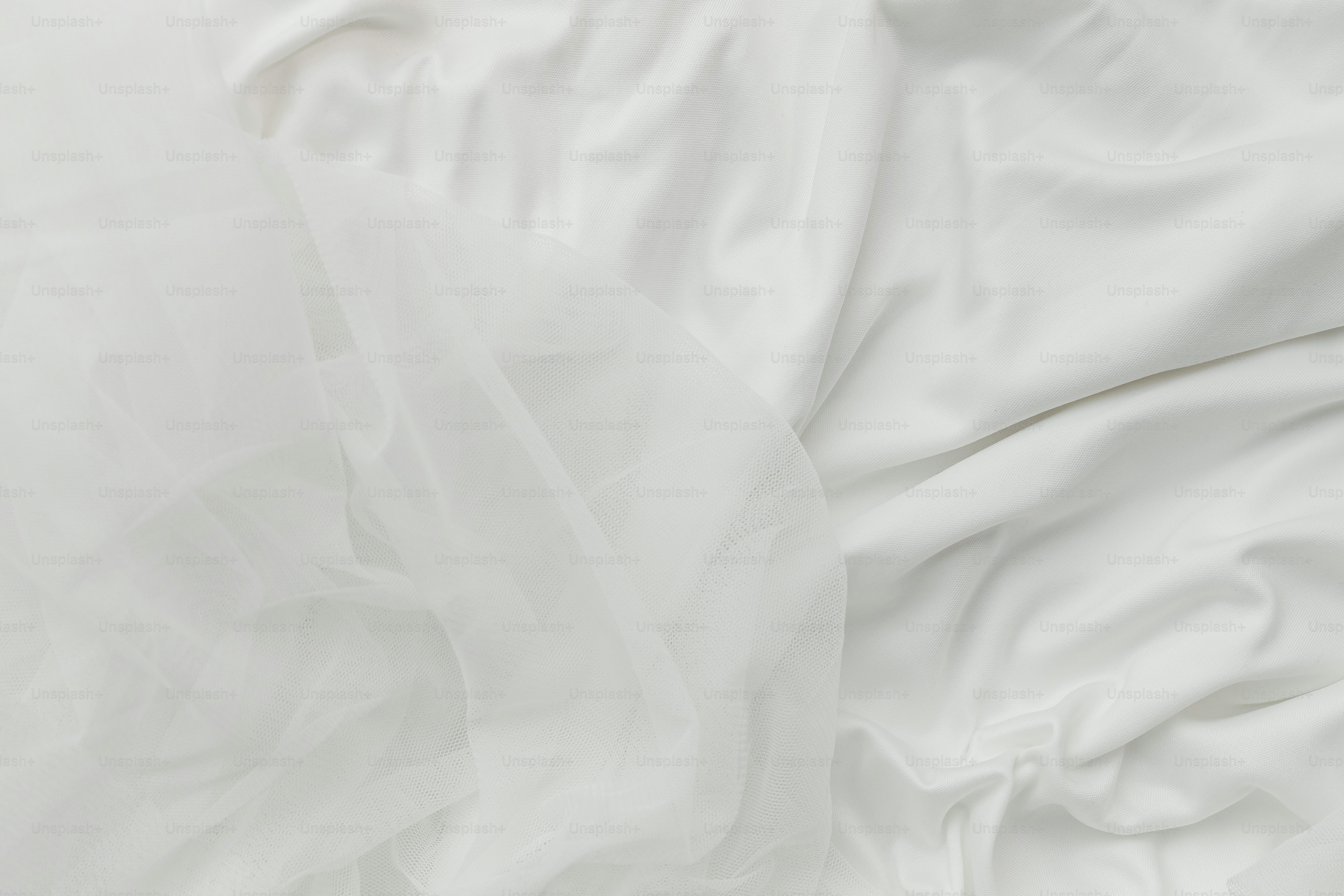 A close up of a bed with white sheets photo – Background Image on Unsplash