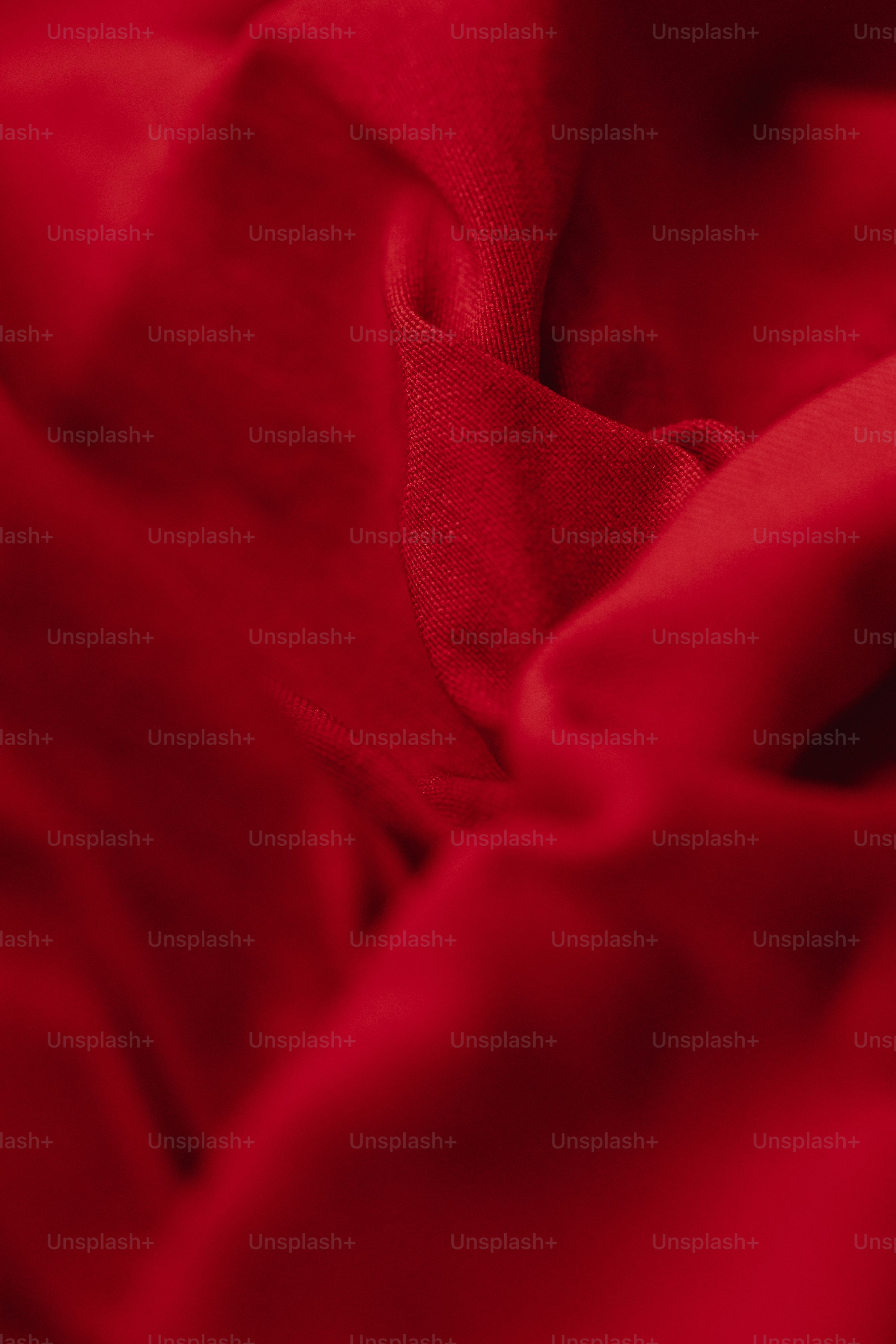 A close up view of a red cloth photo – Red color Image on Unsplash