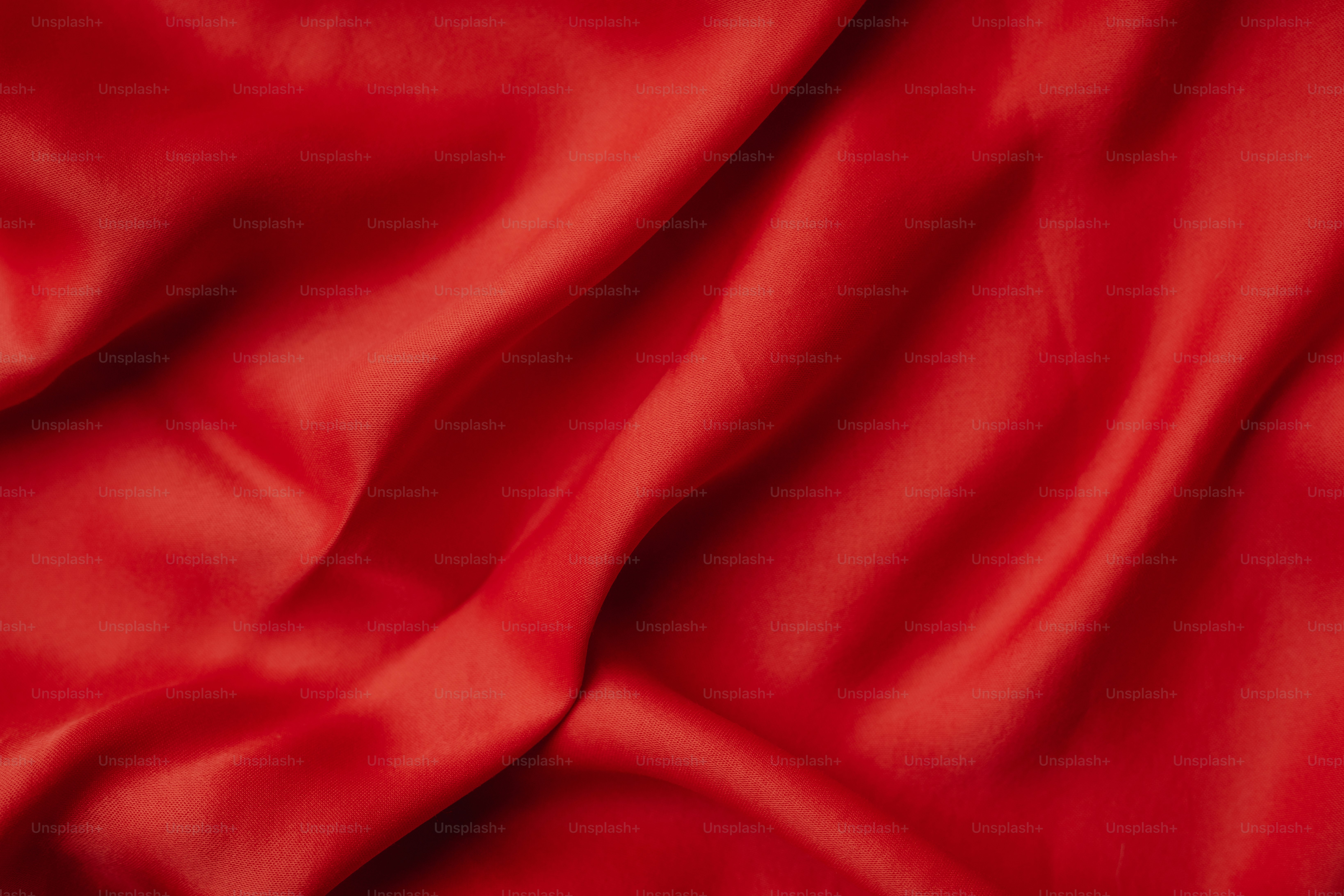 A close up of a red cloth photo – Texture Image on Unsplash