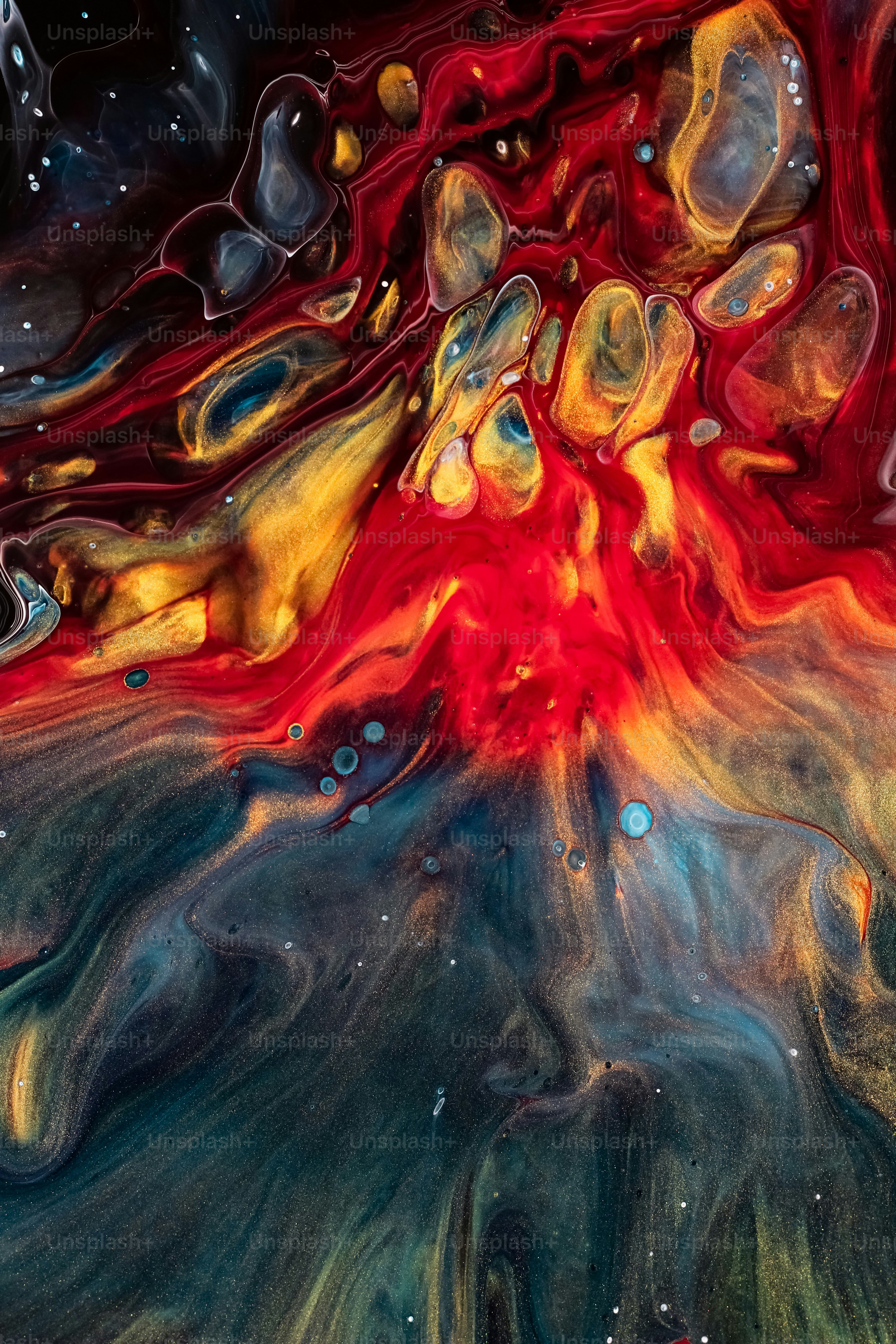 An abstract painting with red, yellow, and blue colors photo – Pattern ...