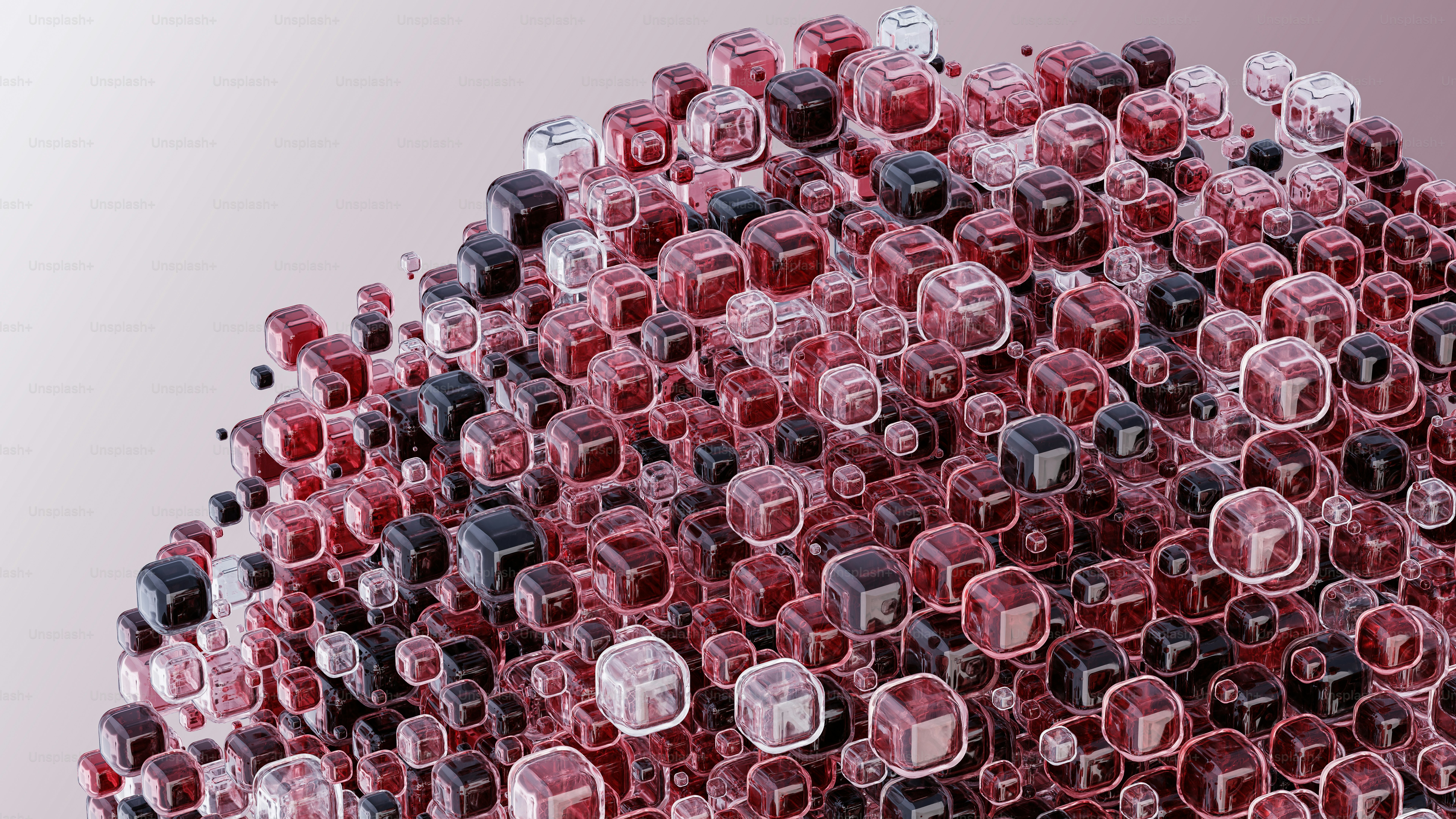 A bunch of red and black objects on a pink background photo ...
