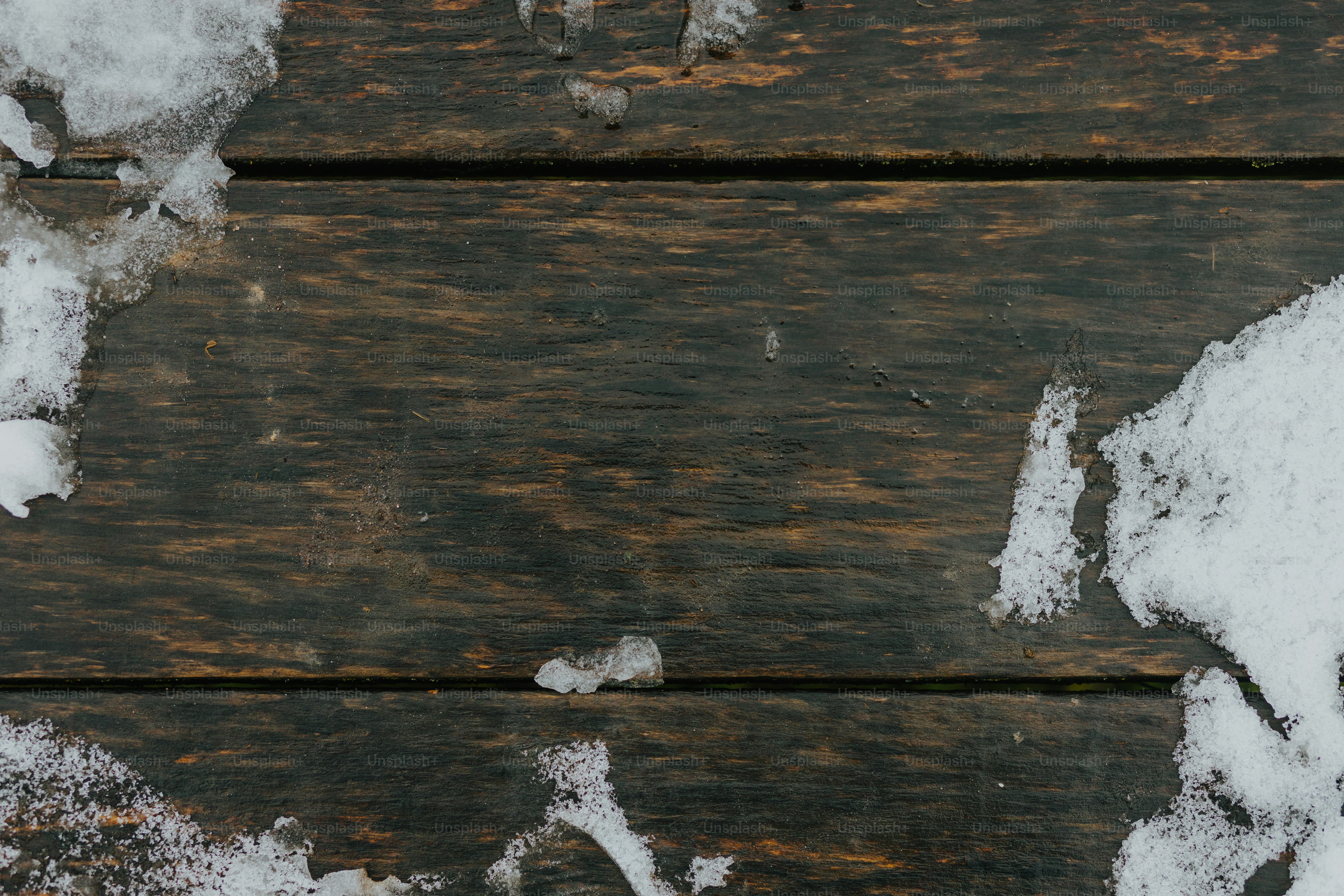 A piece of wood with snow on it photo – Snow Image on Unsplash