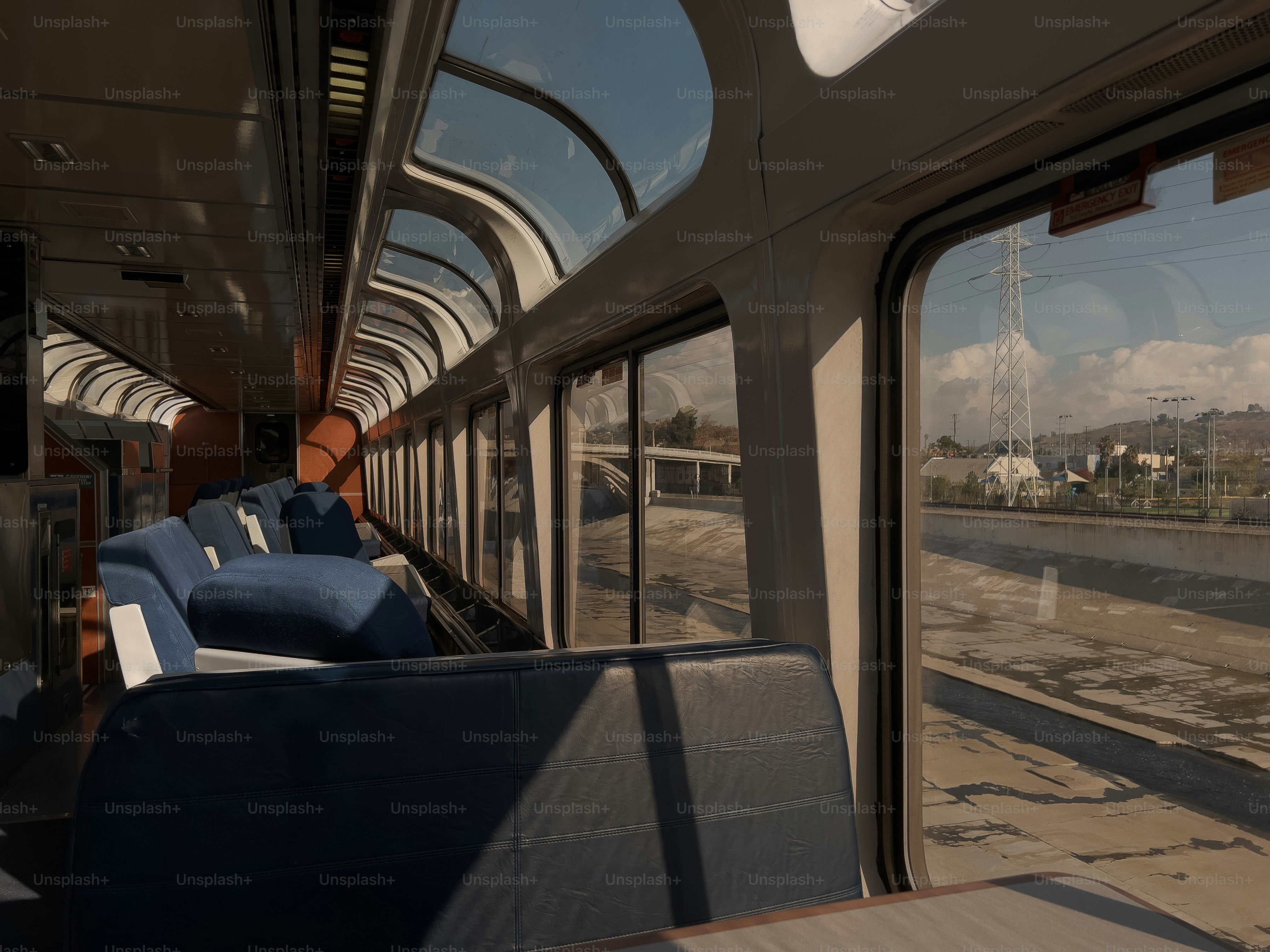 The inside of a train looking out the window photo – Train Image on ...
