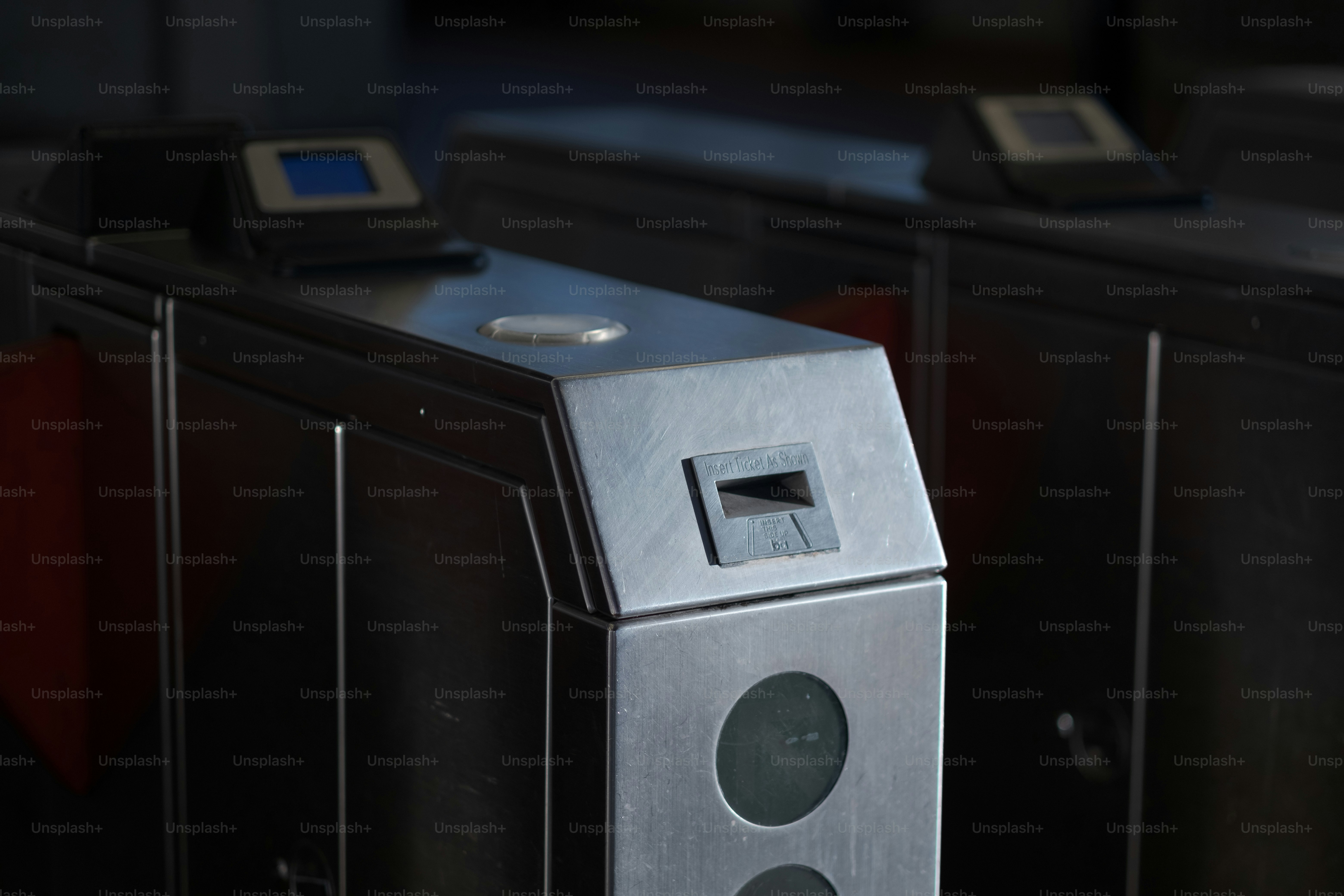 A row of metal lockers sitting next to each other photo – Turnstile ...