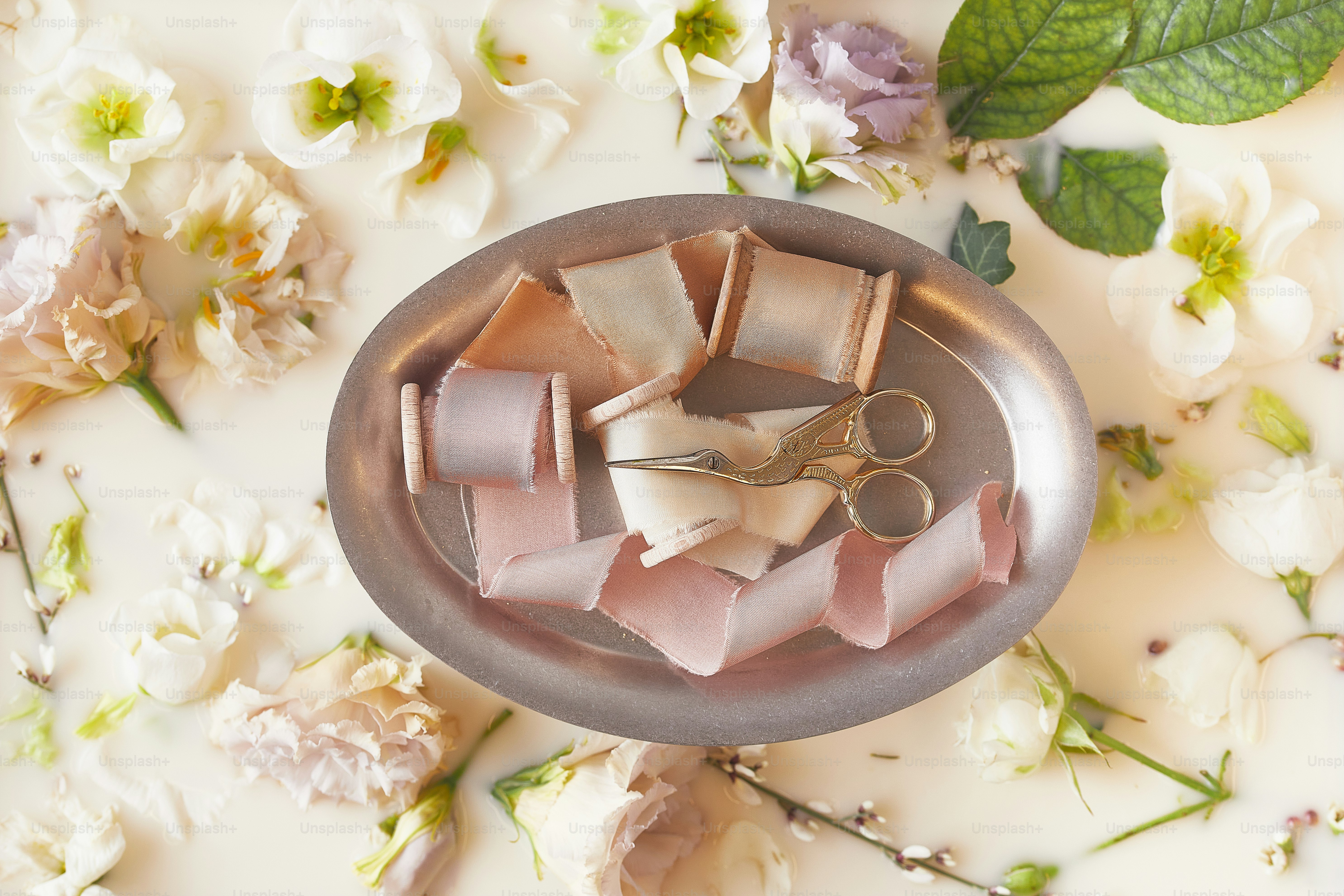 A bowl of cut up food with a pair of scissors photo – Flowers Image on ...