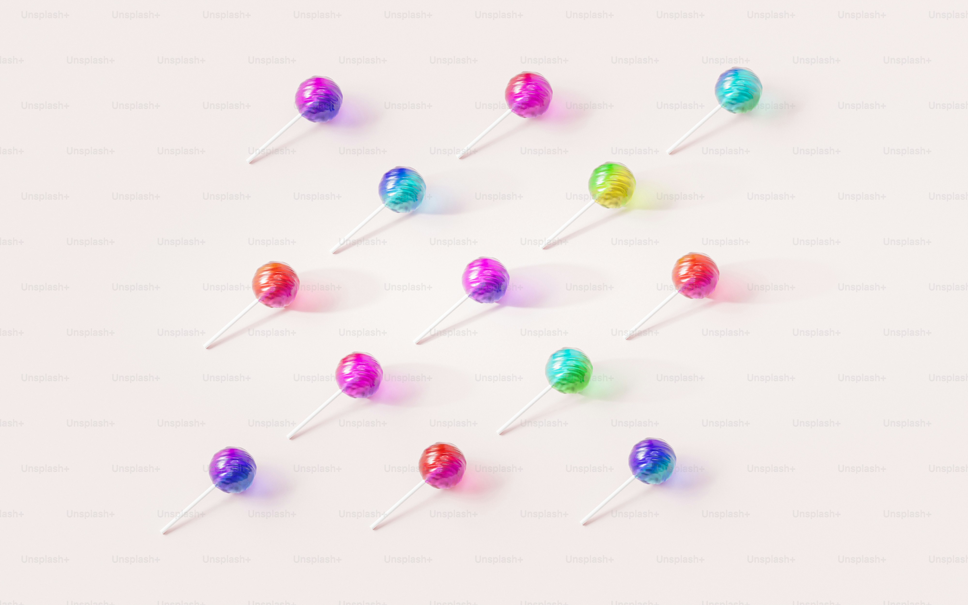 A group of lollipops sitting on top of each other photo – 3d Image on ...