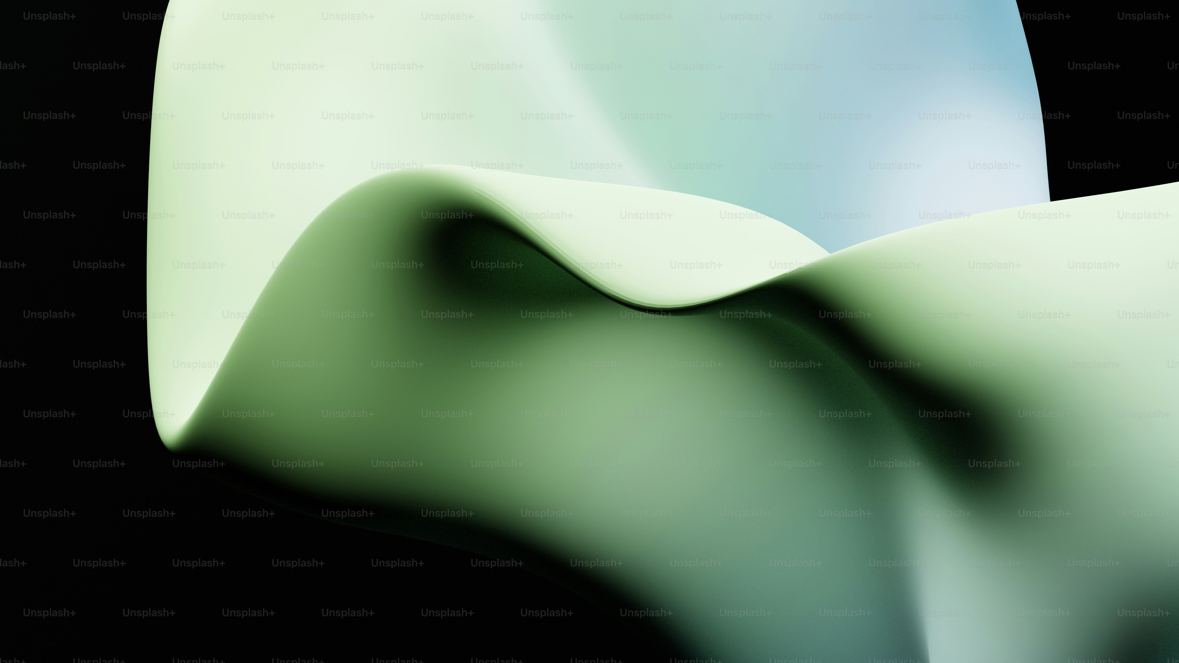 A close up of a green and blue object photo – Wallpaper Image on Unsplash