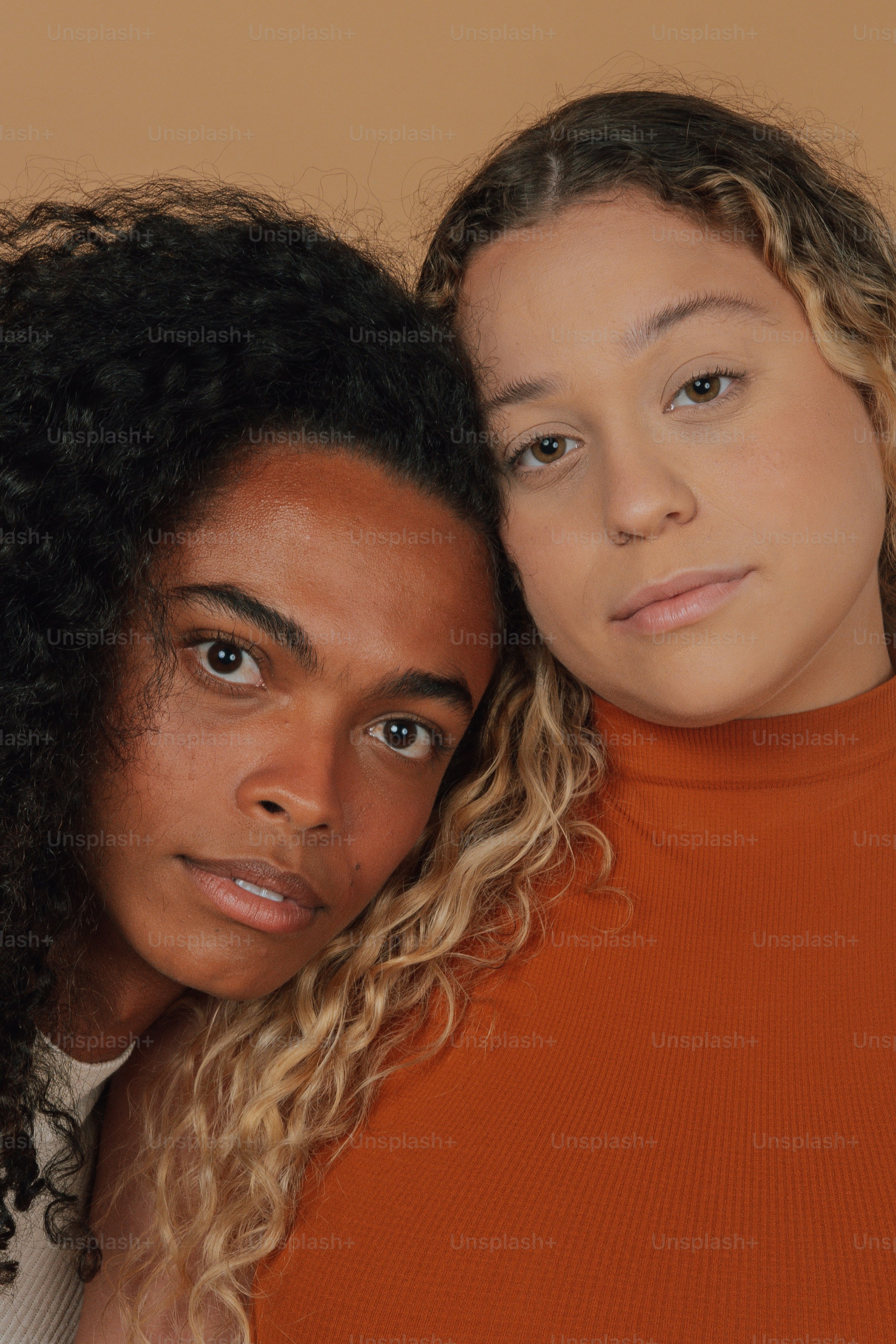 Two women are posing for a picture together photo – Love friends Image ...