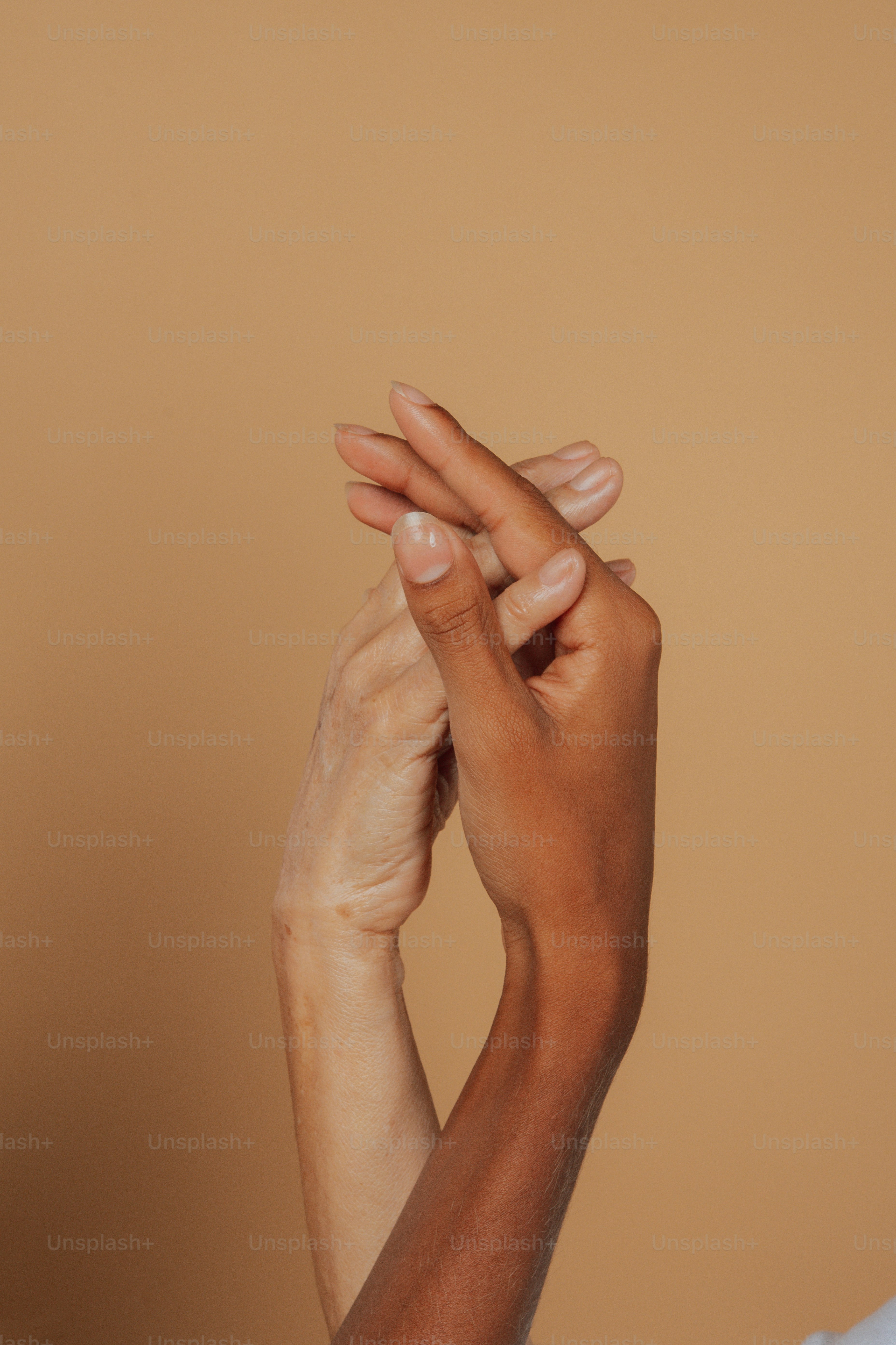 A person holding their hands up in the air photo – Help Image on Unsplash