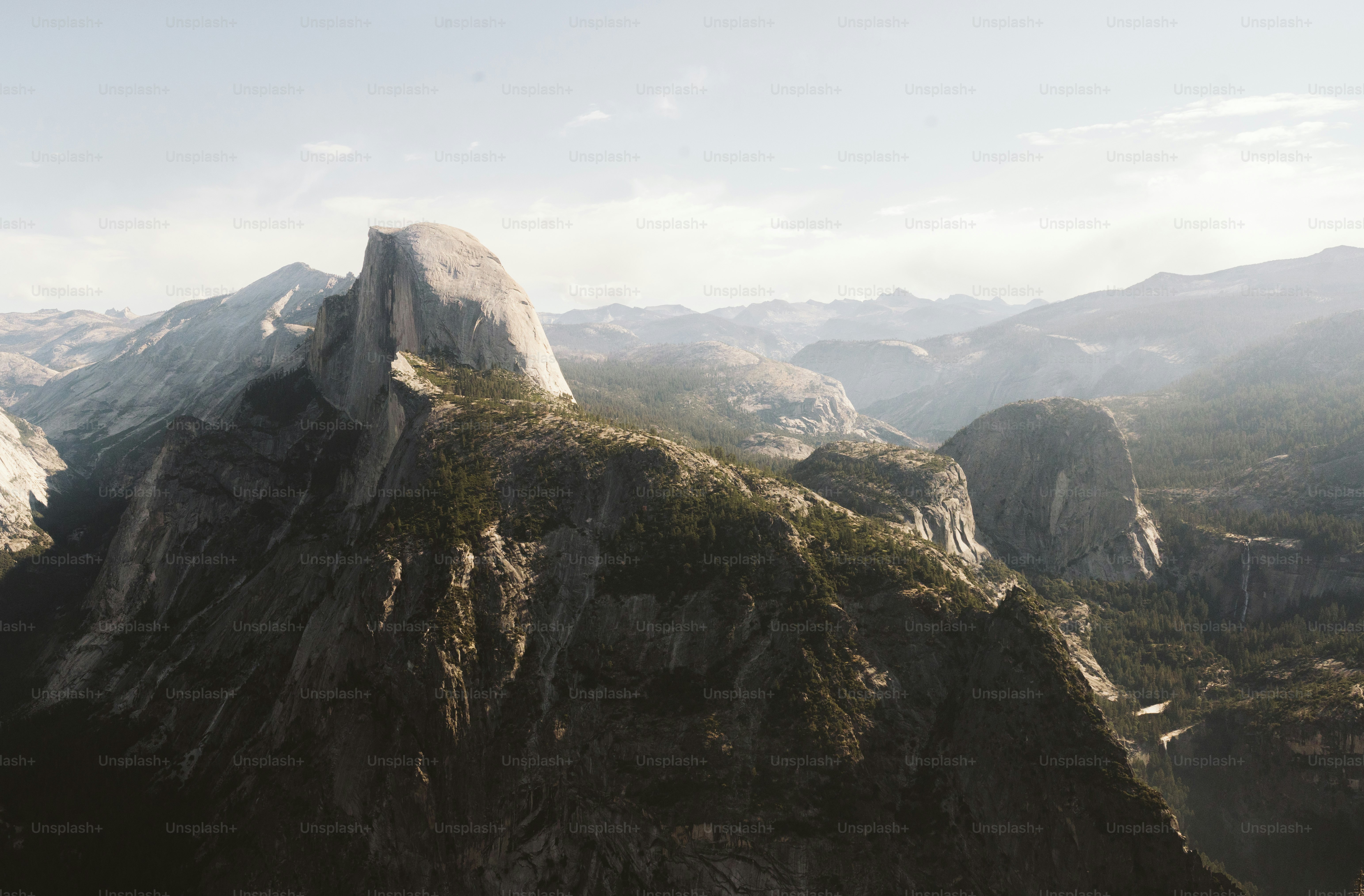A view of a mountain range from a high point of view photo – Nature ...