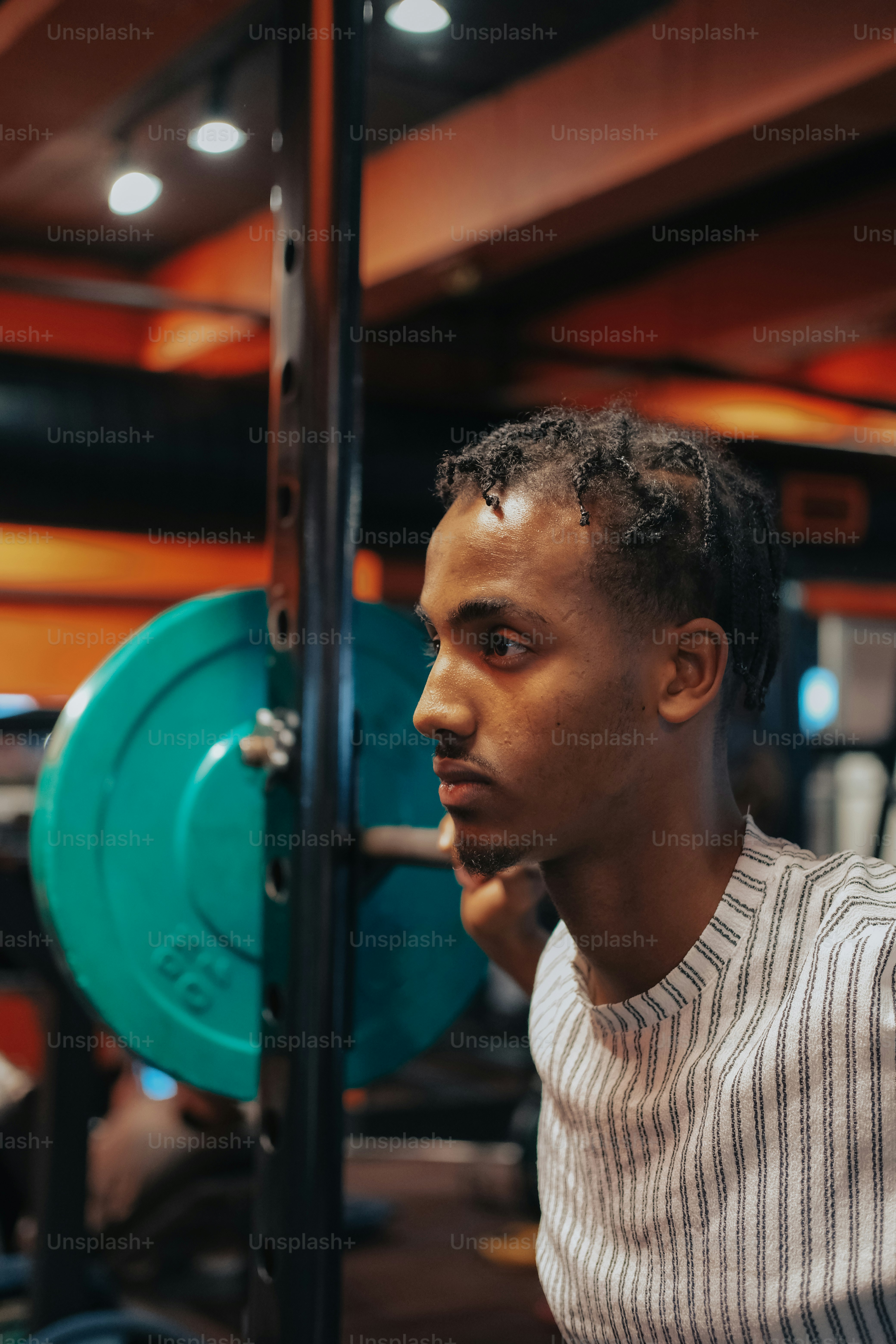 A man with dreadlocks in a gym photo – Fitness Image on Unsplash