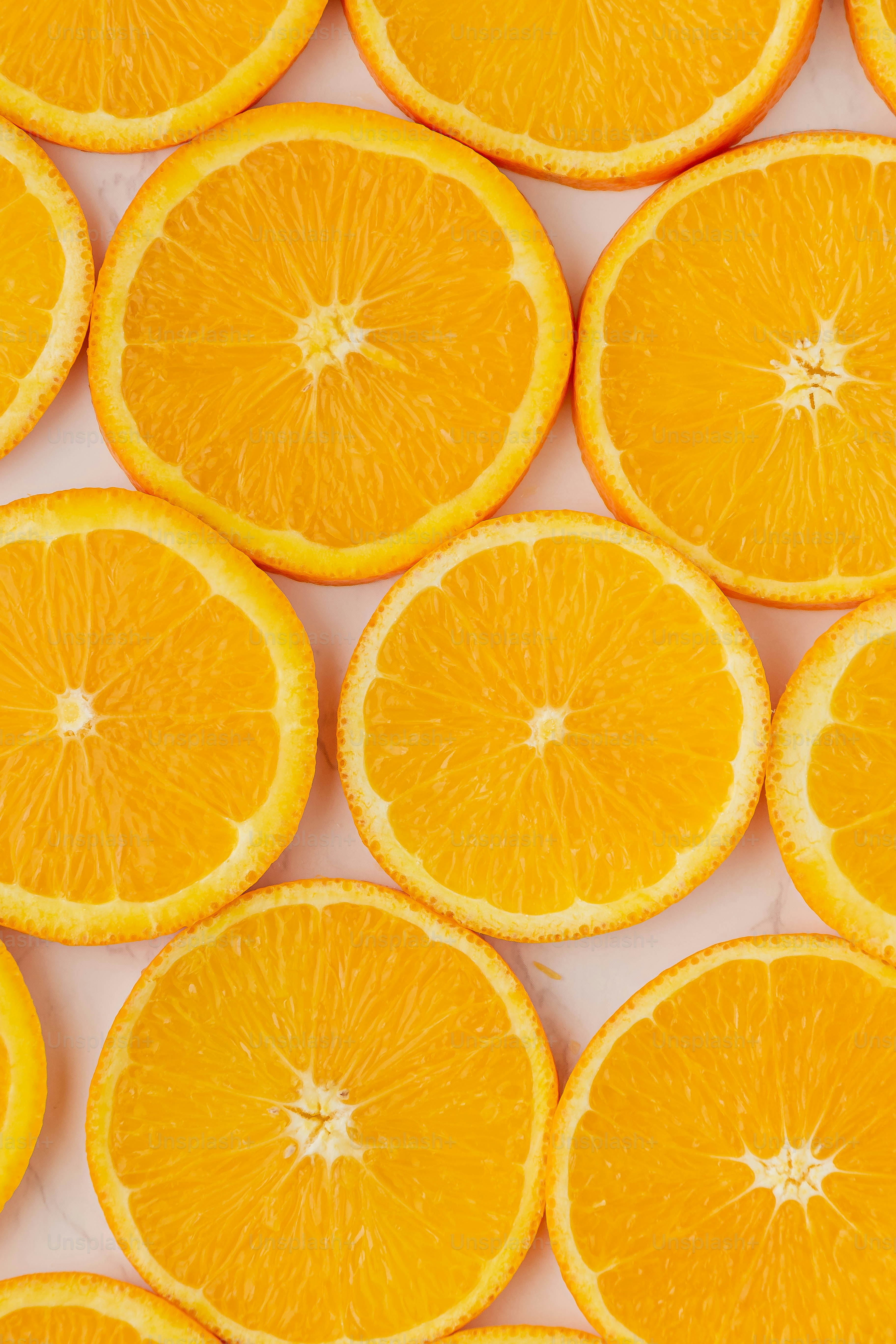 A bunch of oranges that are cut in half photo – Orange Image on Unsplash