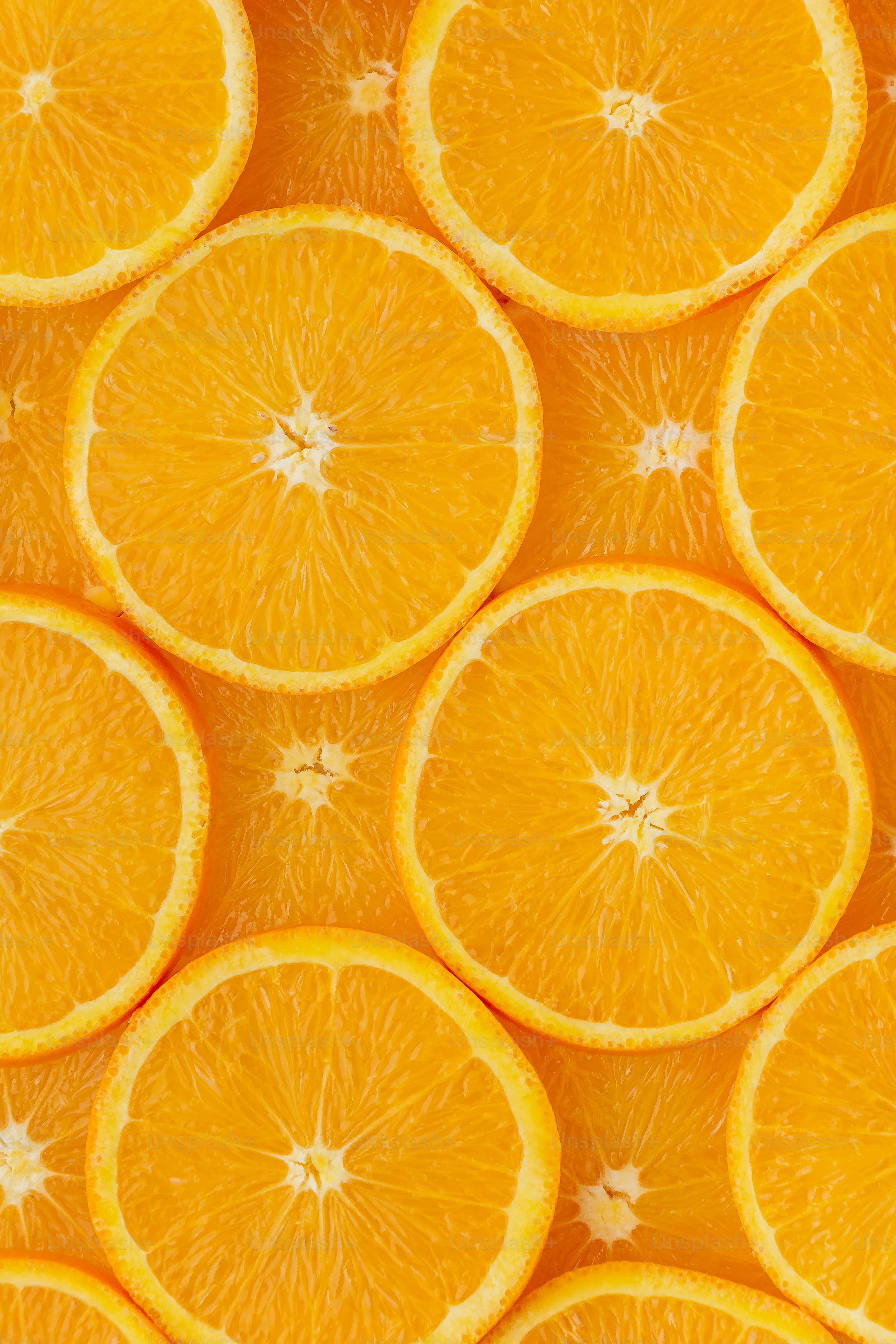 A bunch of oranges that are cut in half photo – Texture Image on Unsplash
