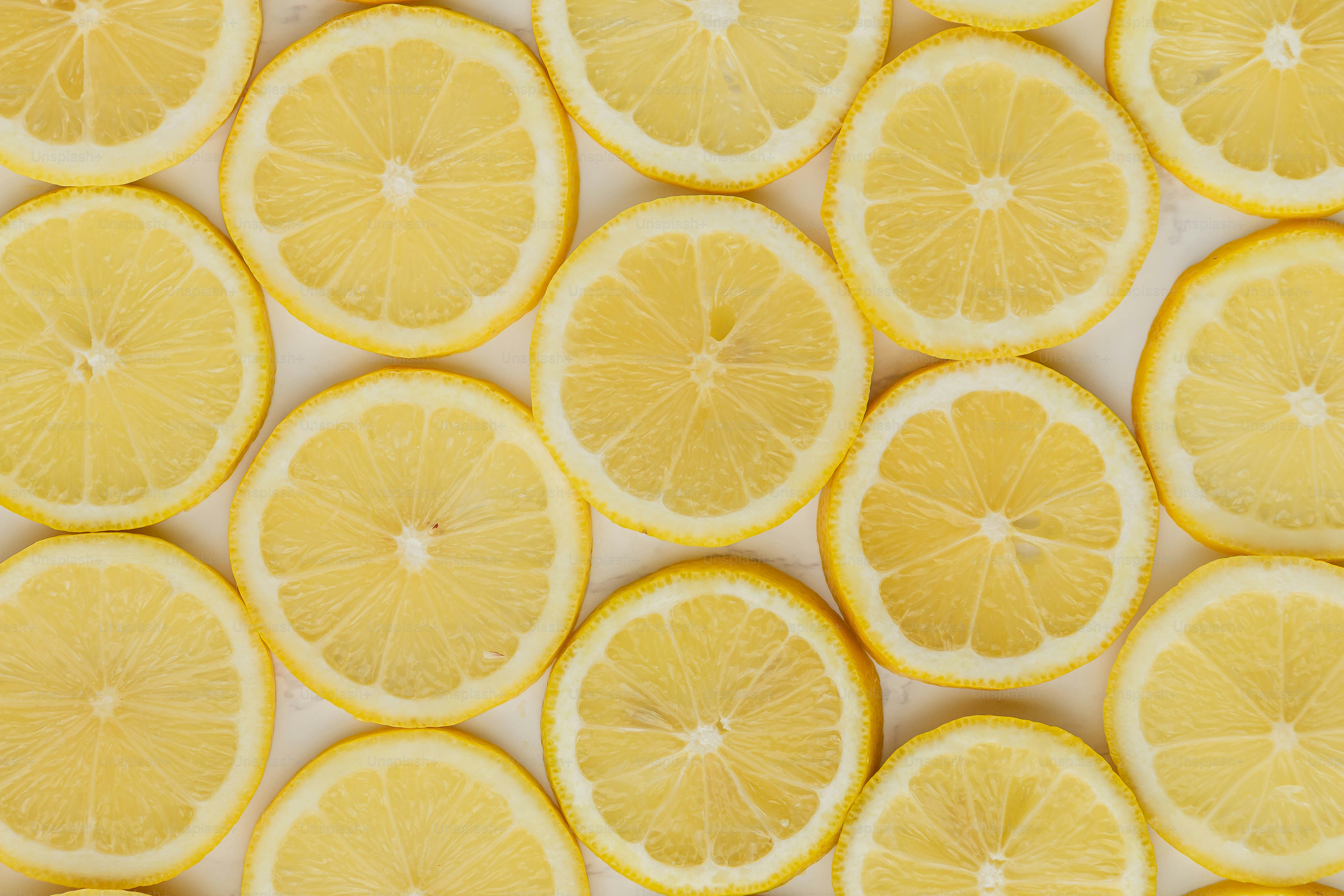 A bunch of lemons that are cut in half photo – Lemon Image on Unsplash
